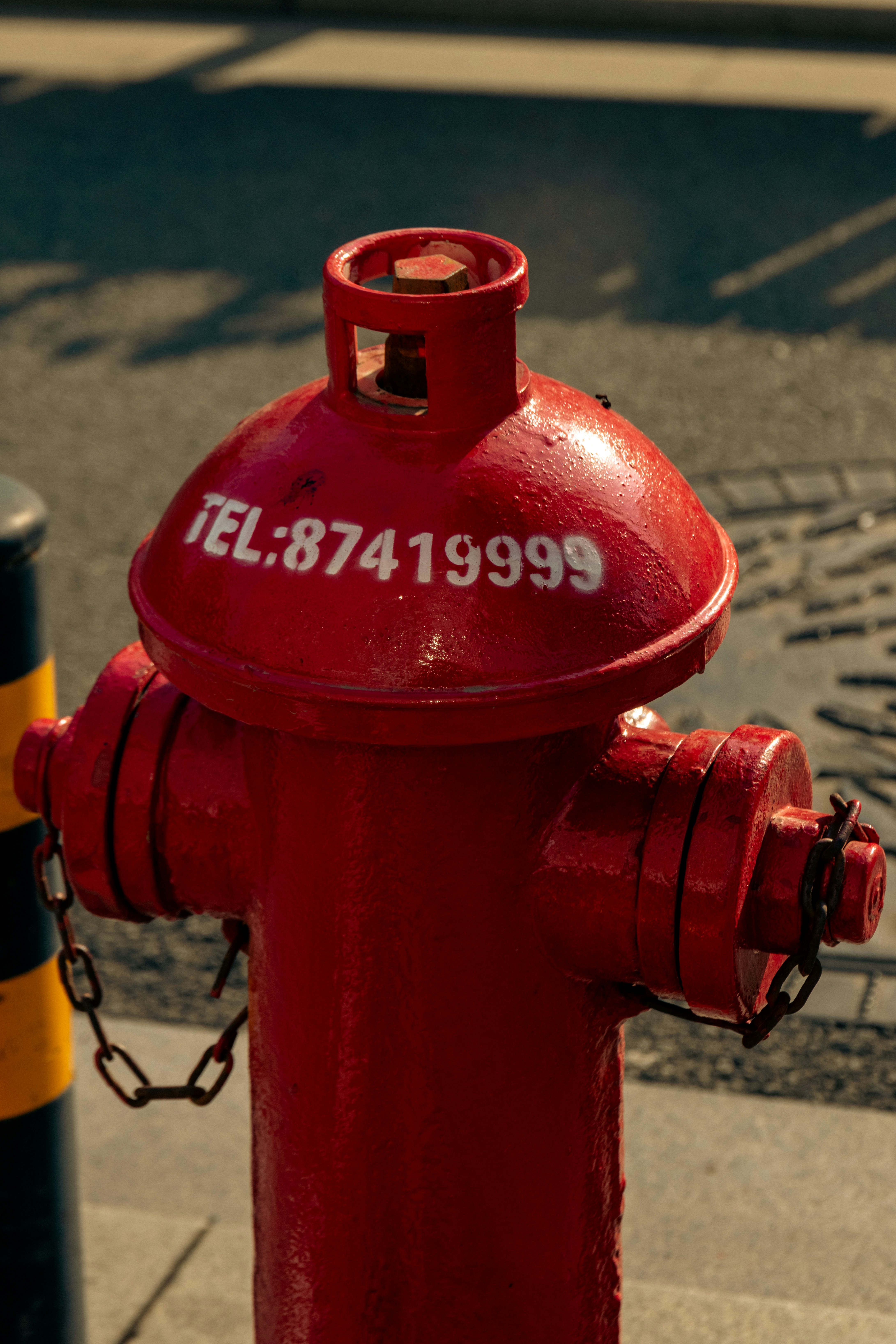 A red fire hydrant sitting on the side of a road photo – Free Fire ...