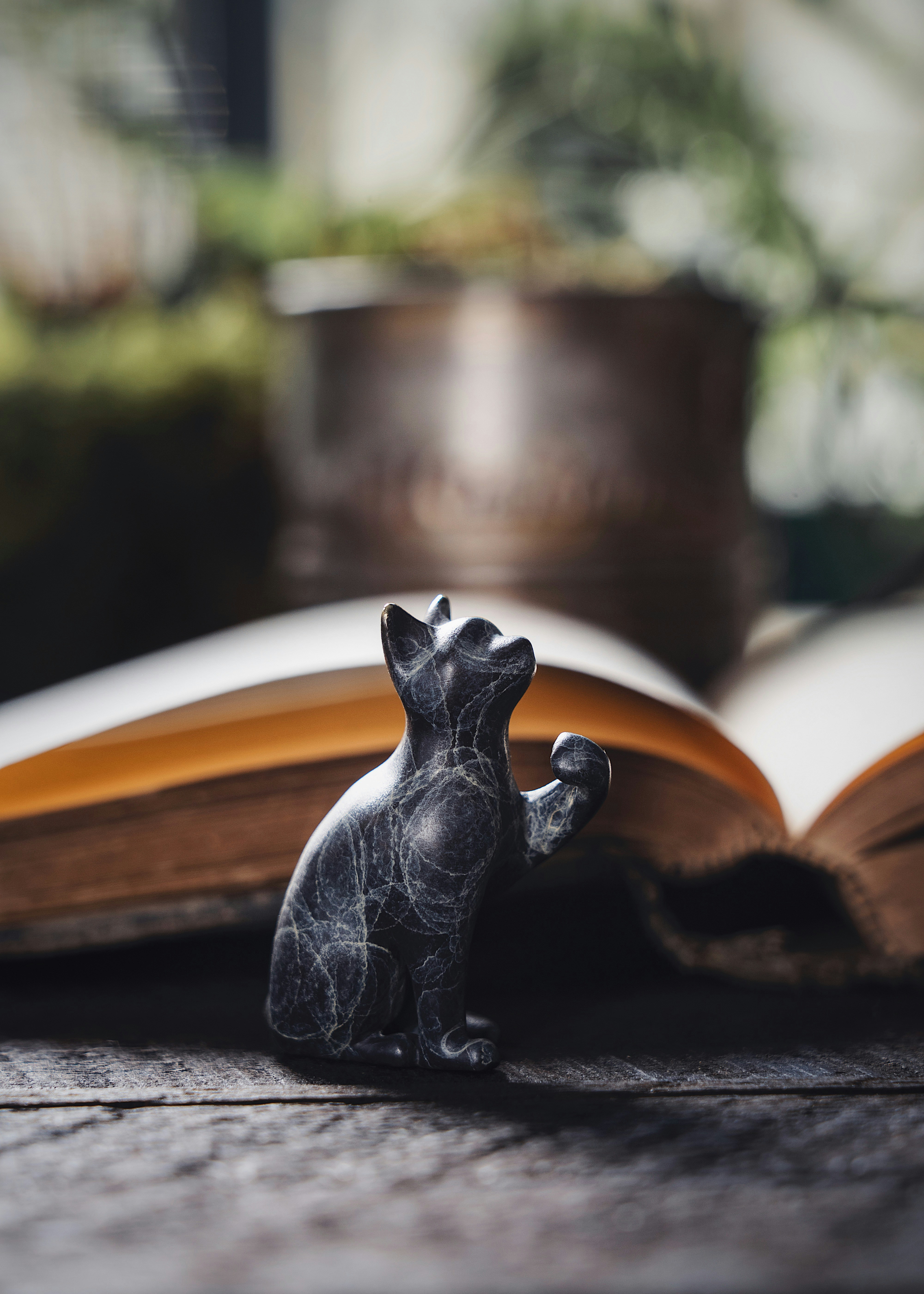 Tiny Marble Cat in Focus: A Quiet Moment with a Marble Figurine