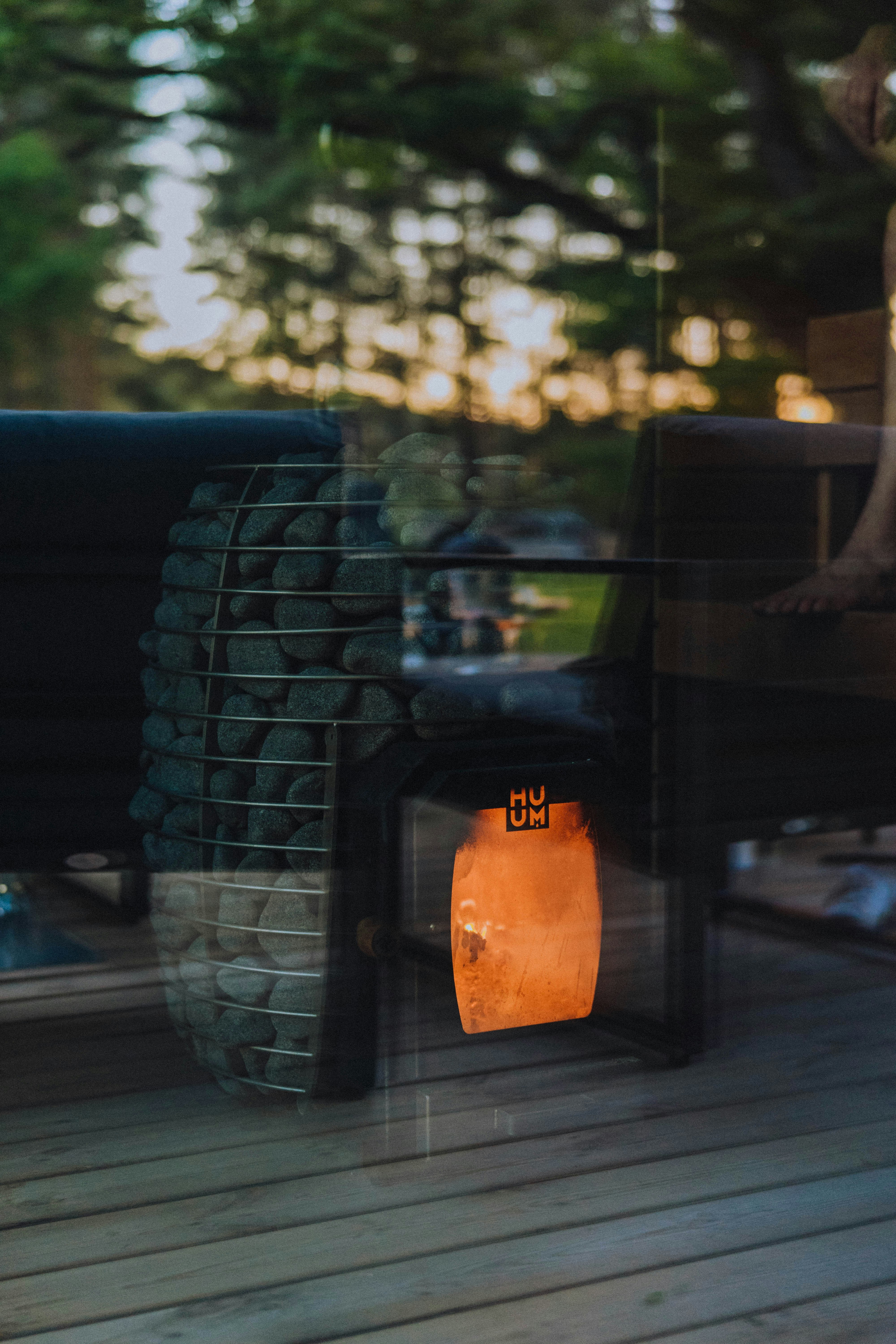A fire hydrant sitting on top of a wooden deck photo – Free Wood Image ...