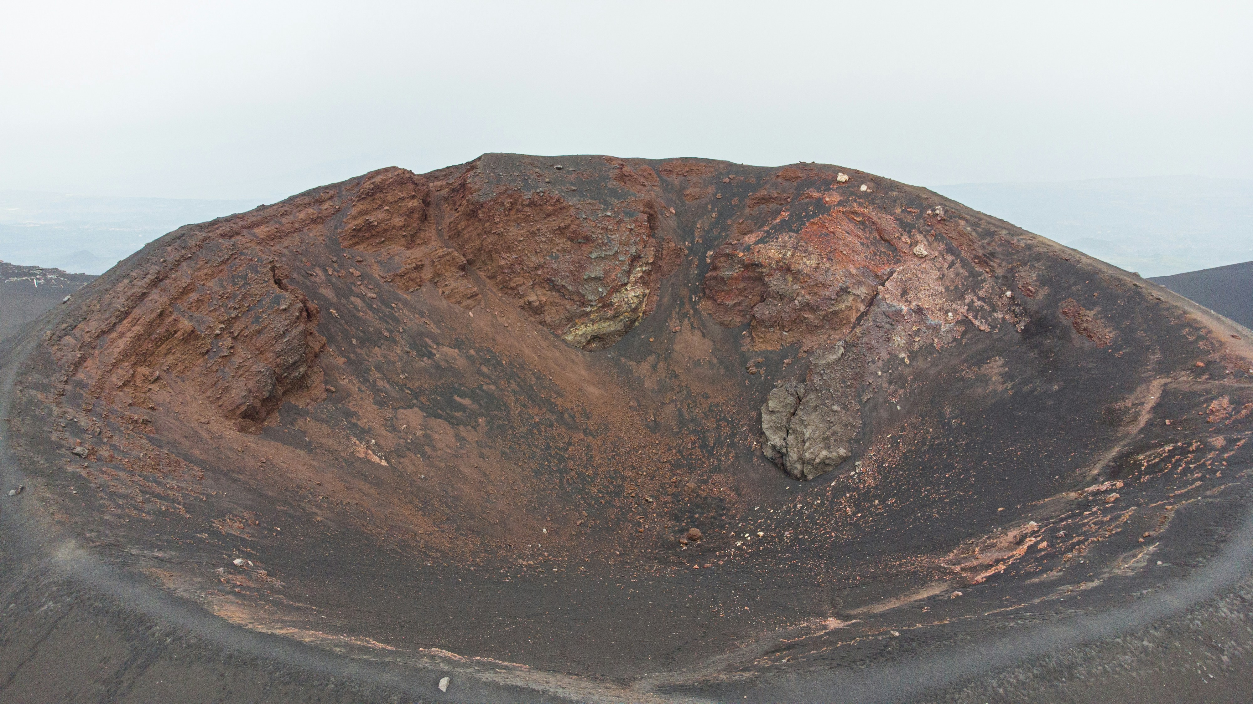A very large rock in the middle of a desert photo – Free Volcano Image ...