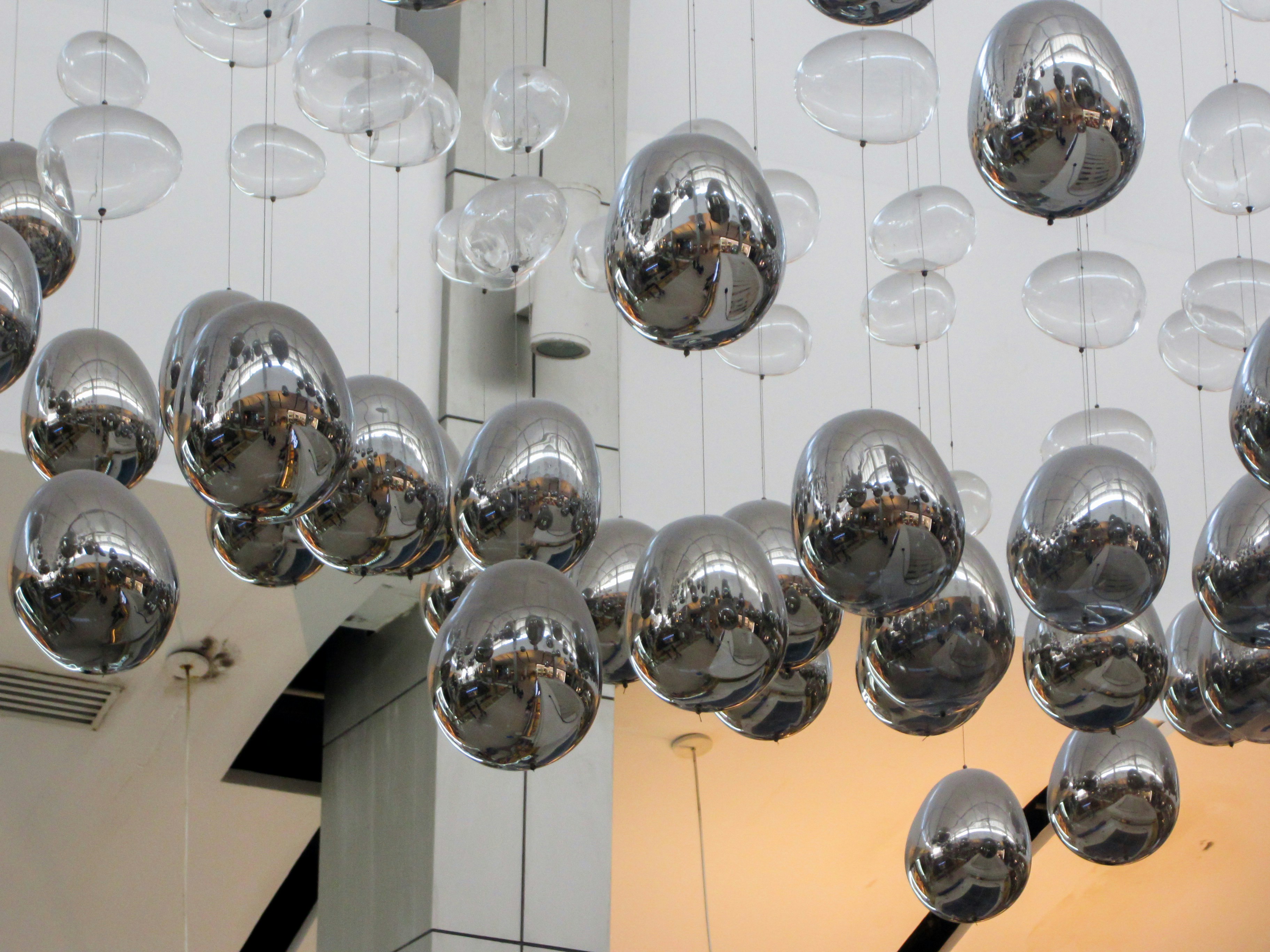 Convergence of Reflections: Suspended Mirror Orbs in a Contemporary Atrium
