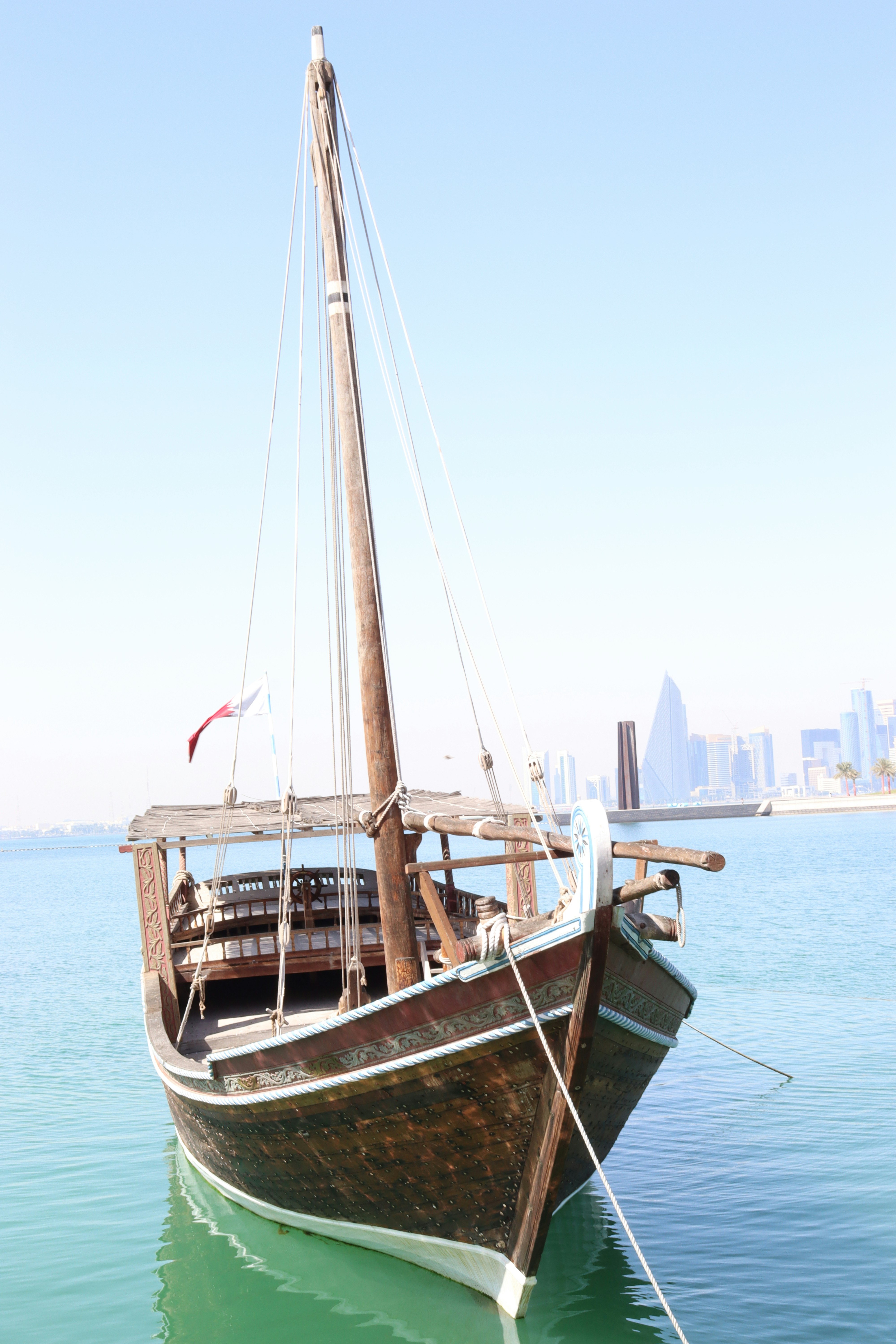 an old boat in the middle of the ocean