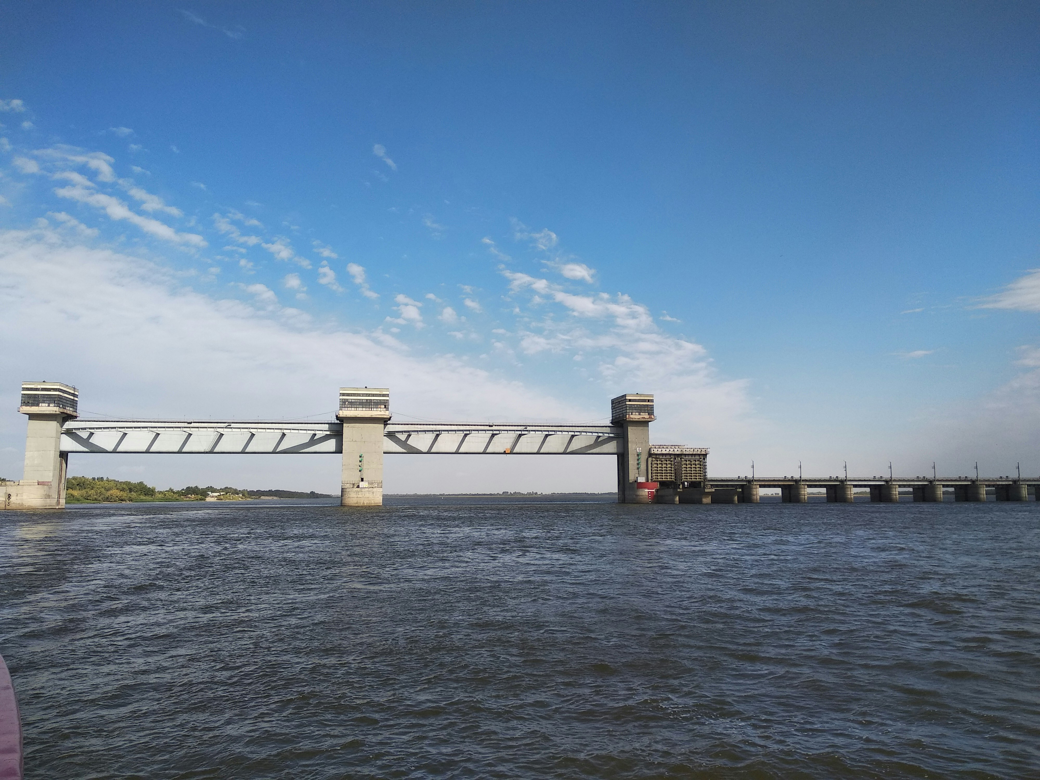 A long bridge over a large body of water photo – Free River Image on ...