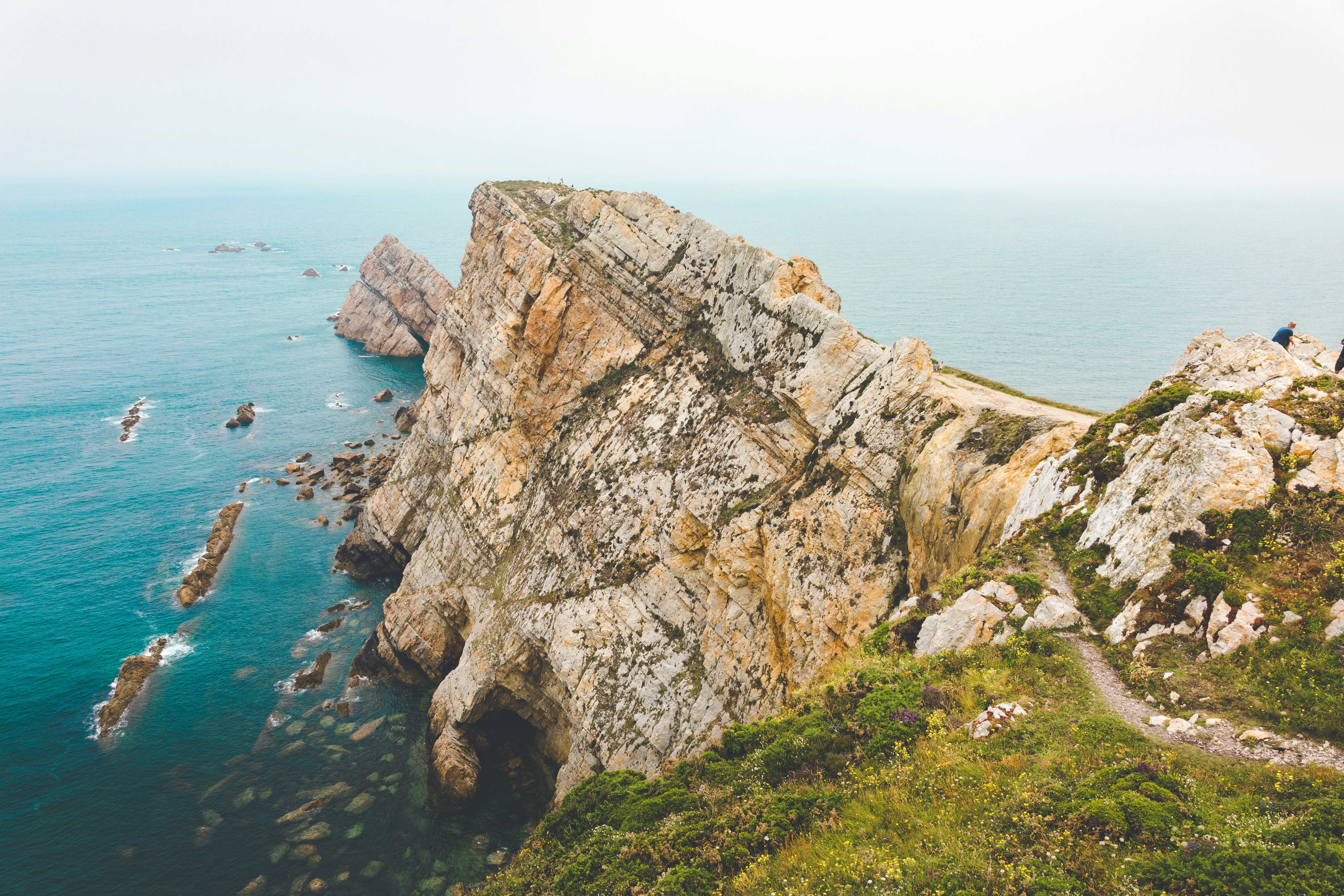 Cliffside Pathway Overlooking Azure Seas