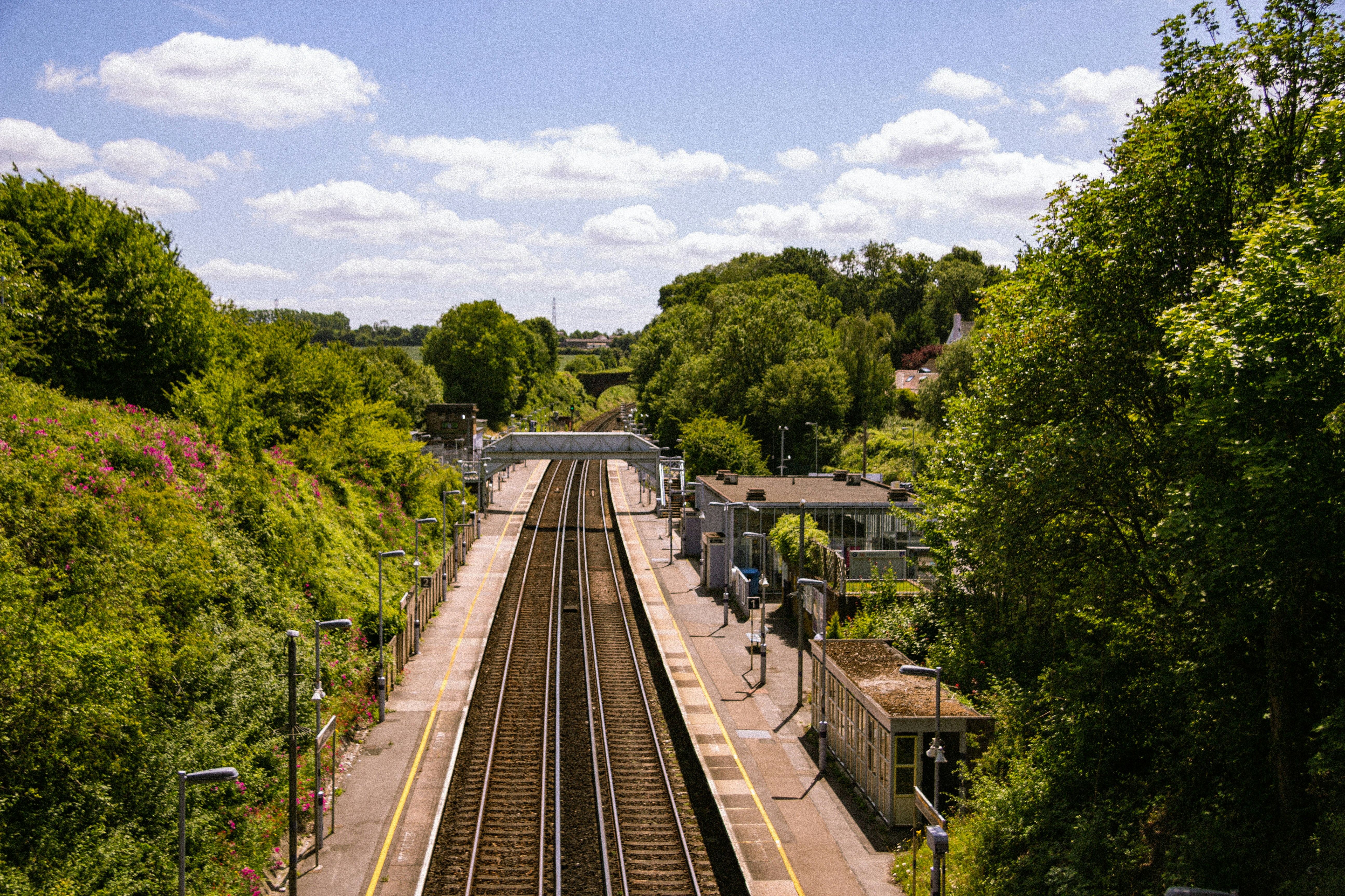 A view of a train track from above photo – Free Train tracks Image on ...