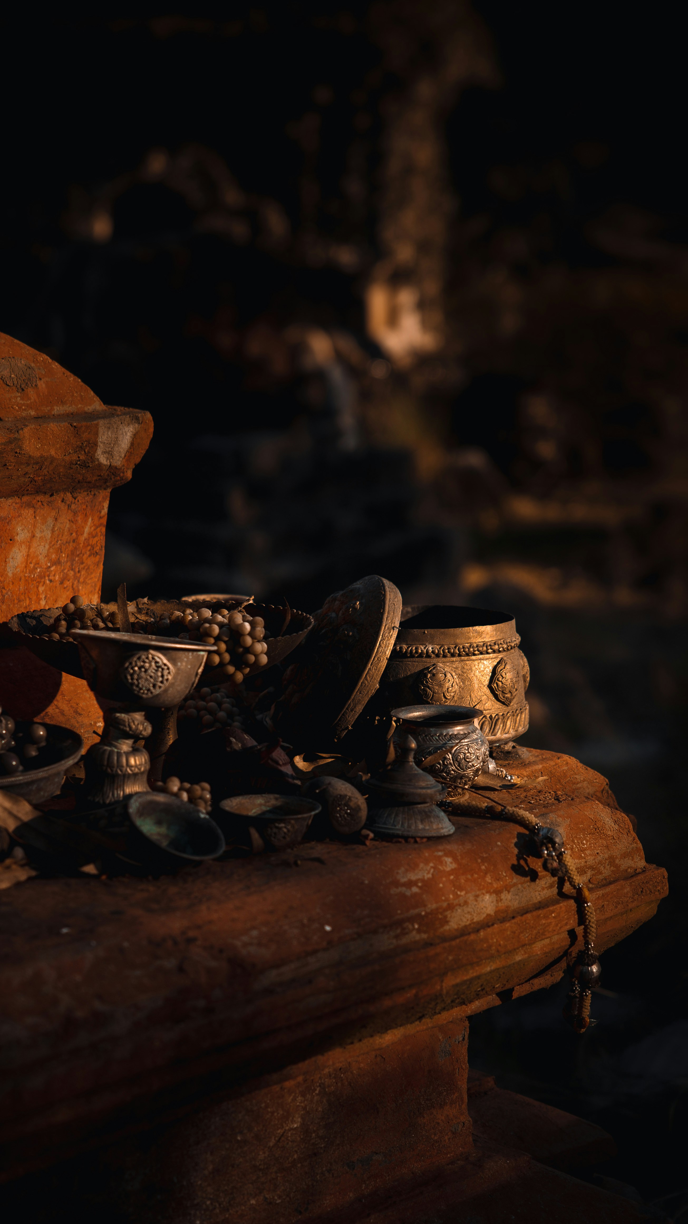 A wooden table topped with lots of metal items photo – Free Wood Image ...