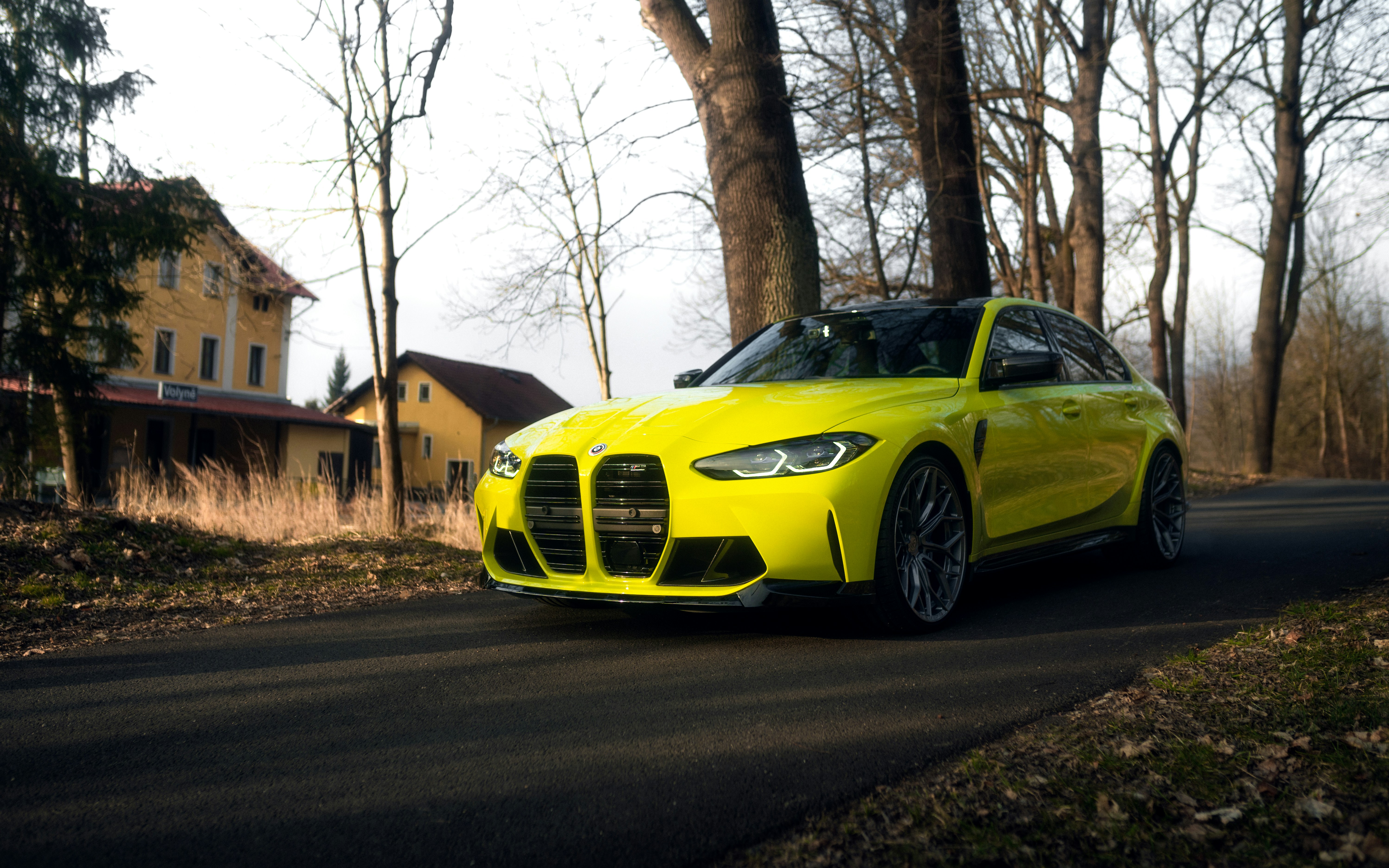 A yellow sports car driving down the road photo – Free Volyně Image on ...