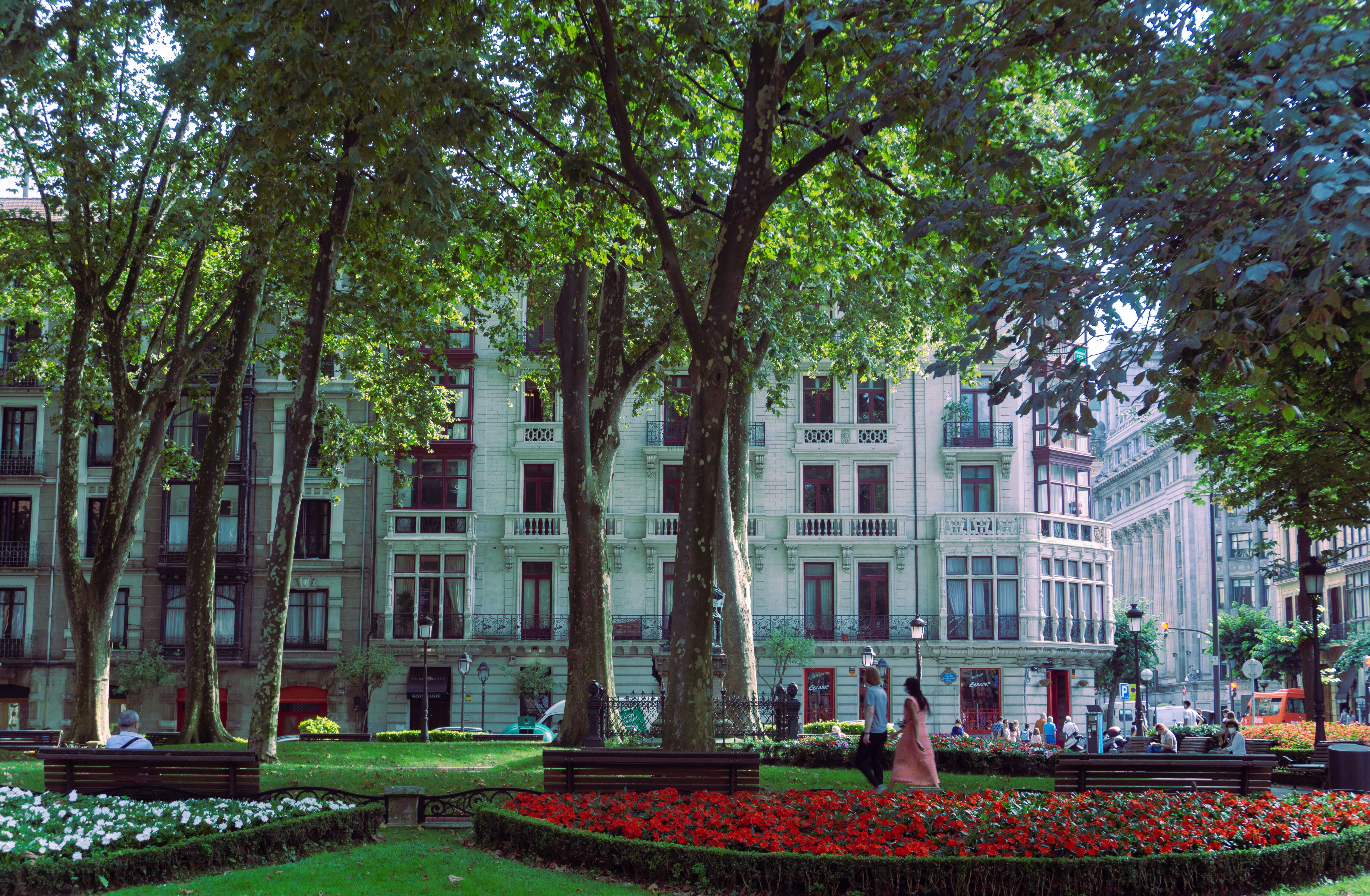A couple in love walking in the park in Bilbao, Spain