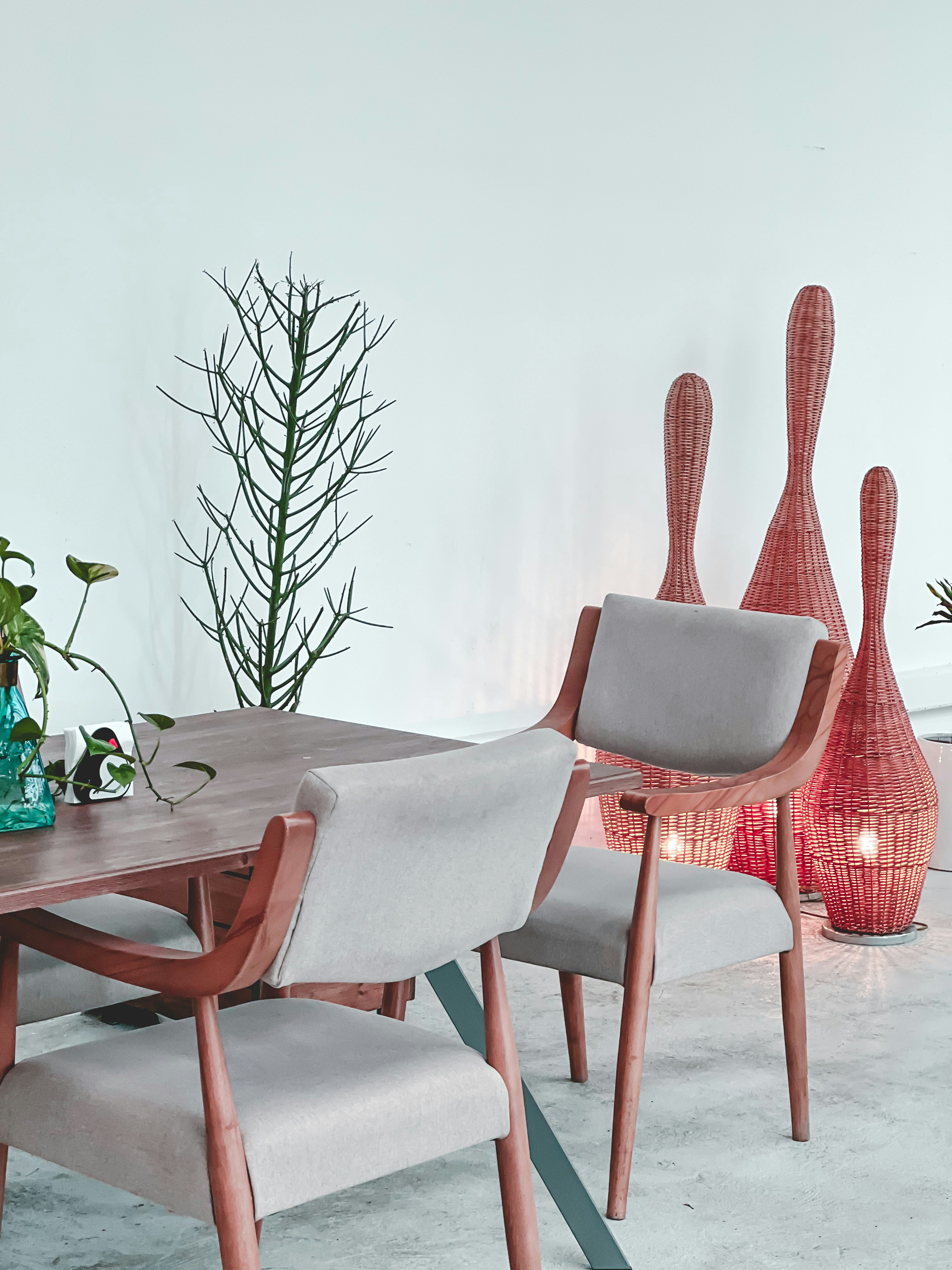 Minimalist Dining Nook with Sculptural Lanterns