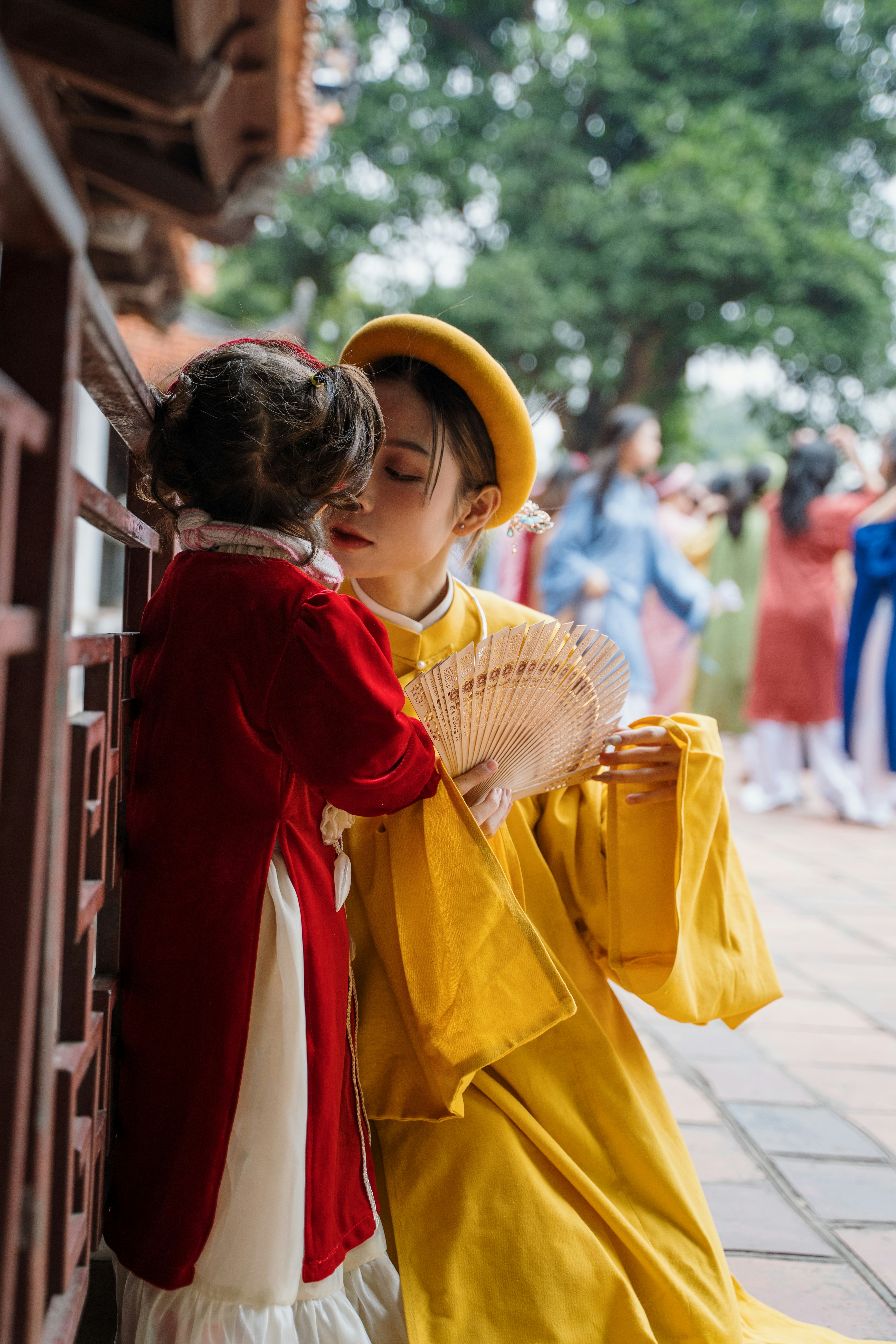Yellow-robed Encounter: A Gentle Kiss at the Temple Gate