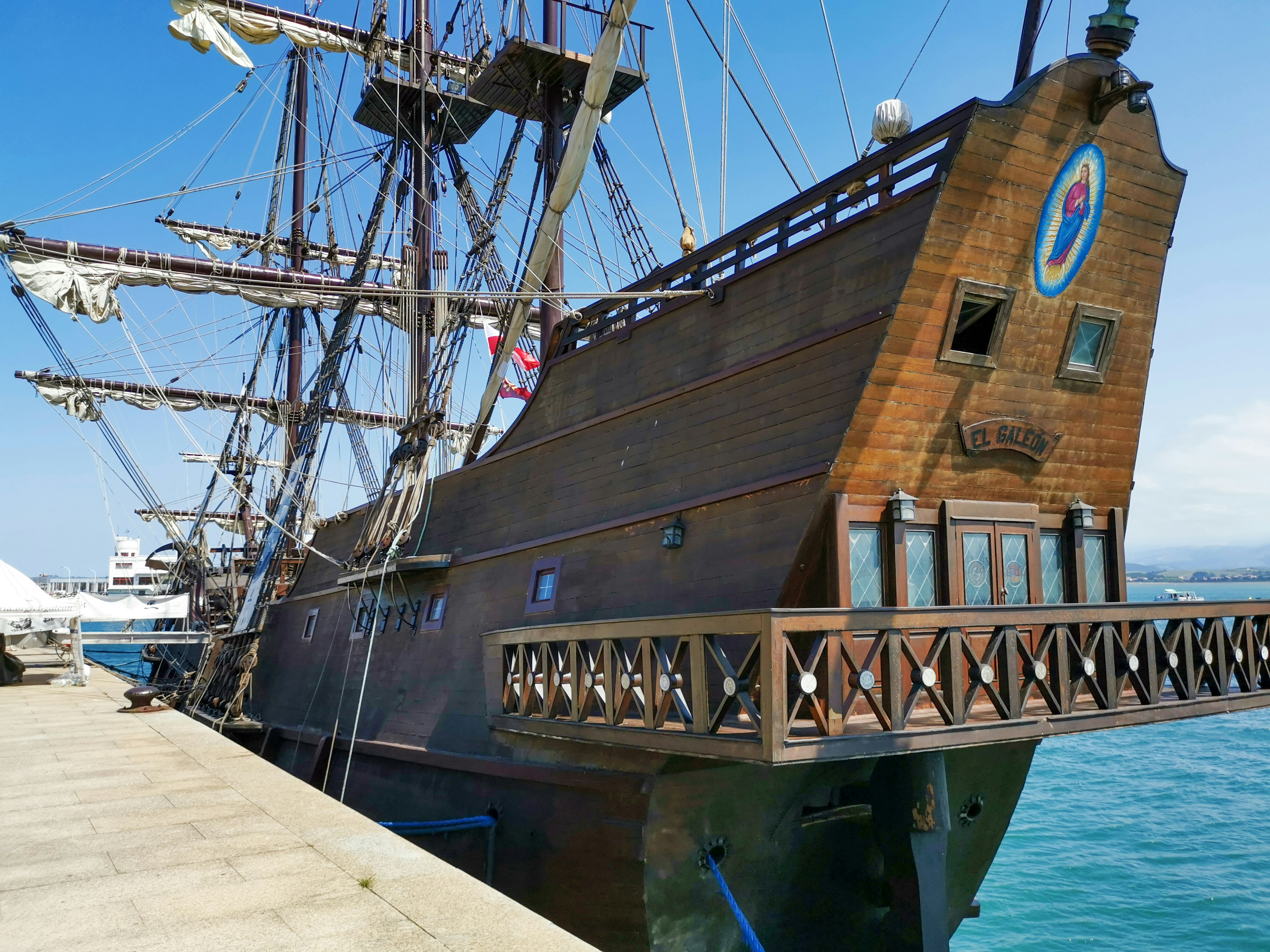 A large wooden ship docked at a pier photo – Free Thelionics Image on ...
