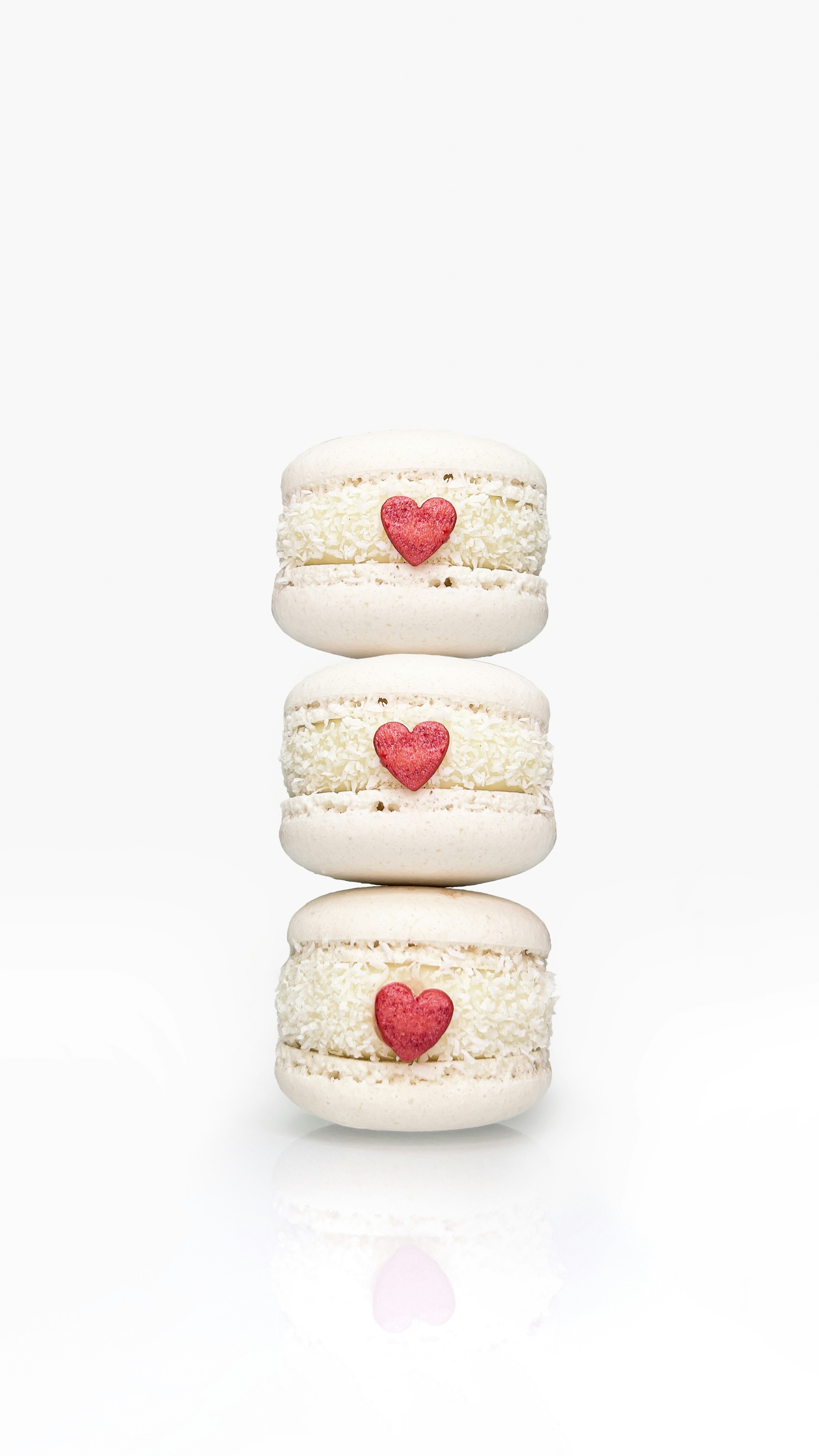 A stack of three macaroons with hearts on them photo – Free Prague Image on Unsplash