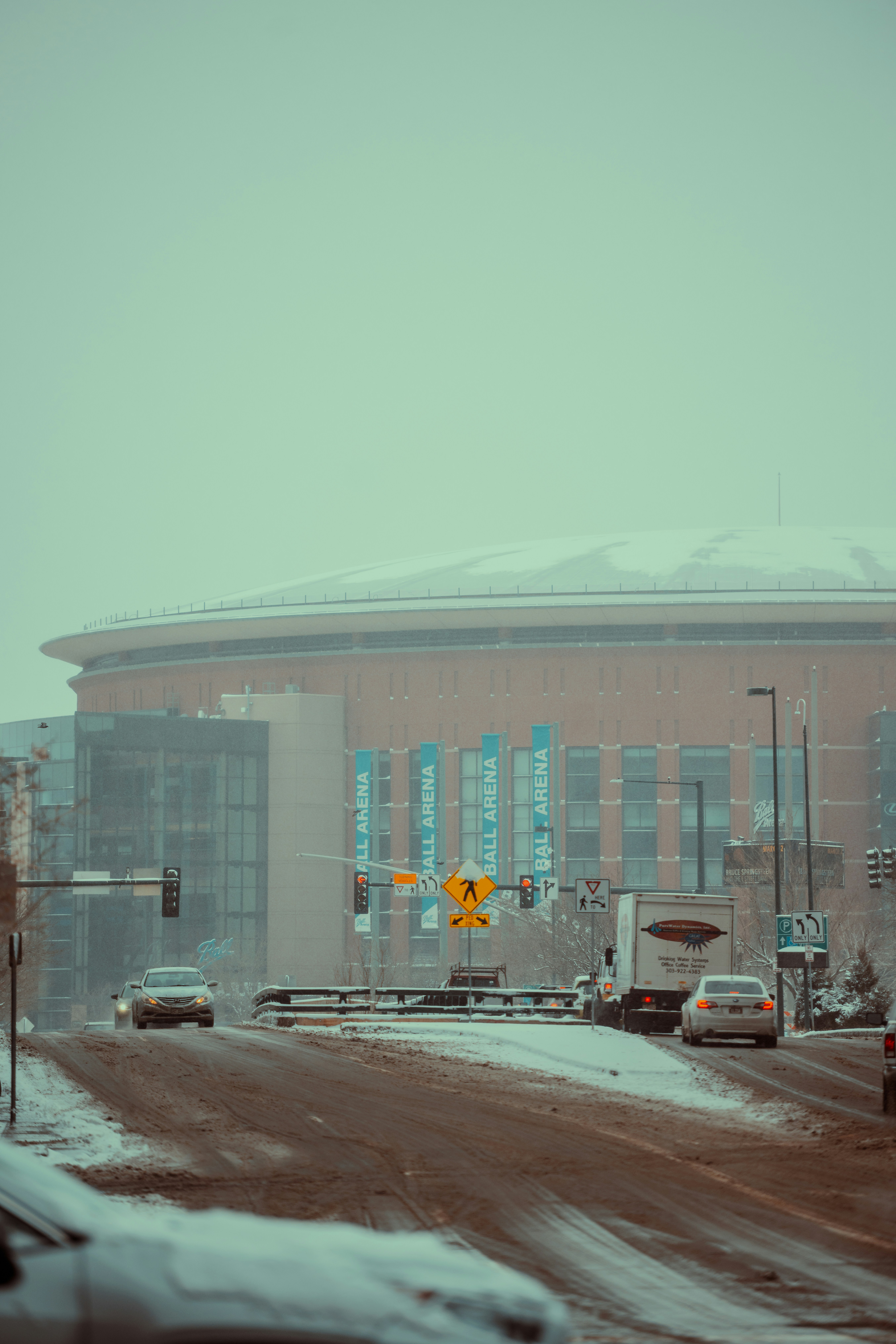 A building with a traffic light in front of it photo – Free Denver ...