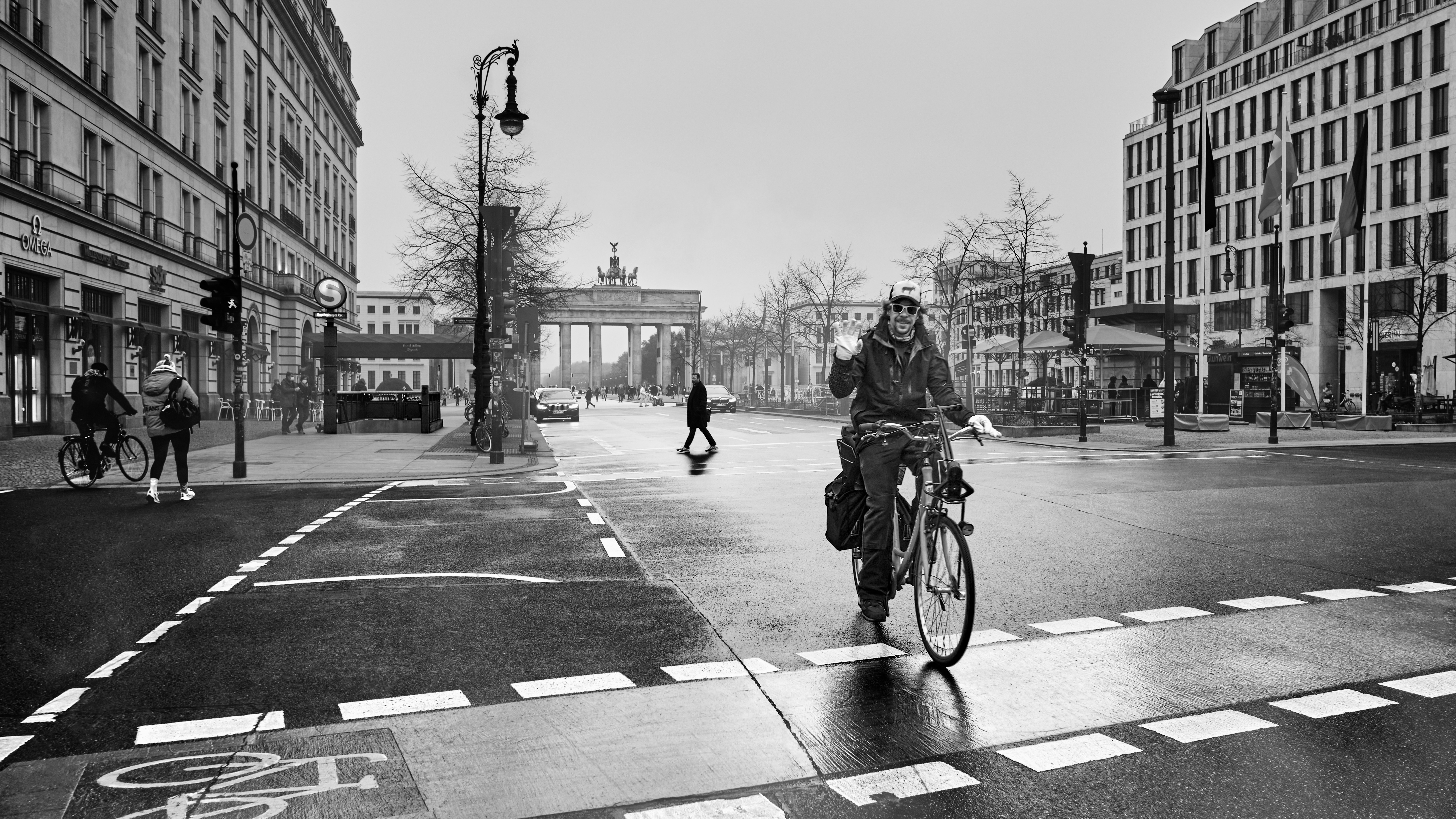Cyclist at the Converging Crossroads: A Monochrome City Crossing