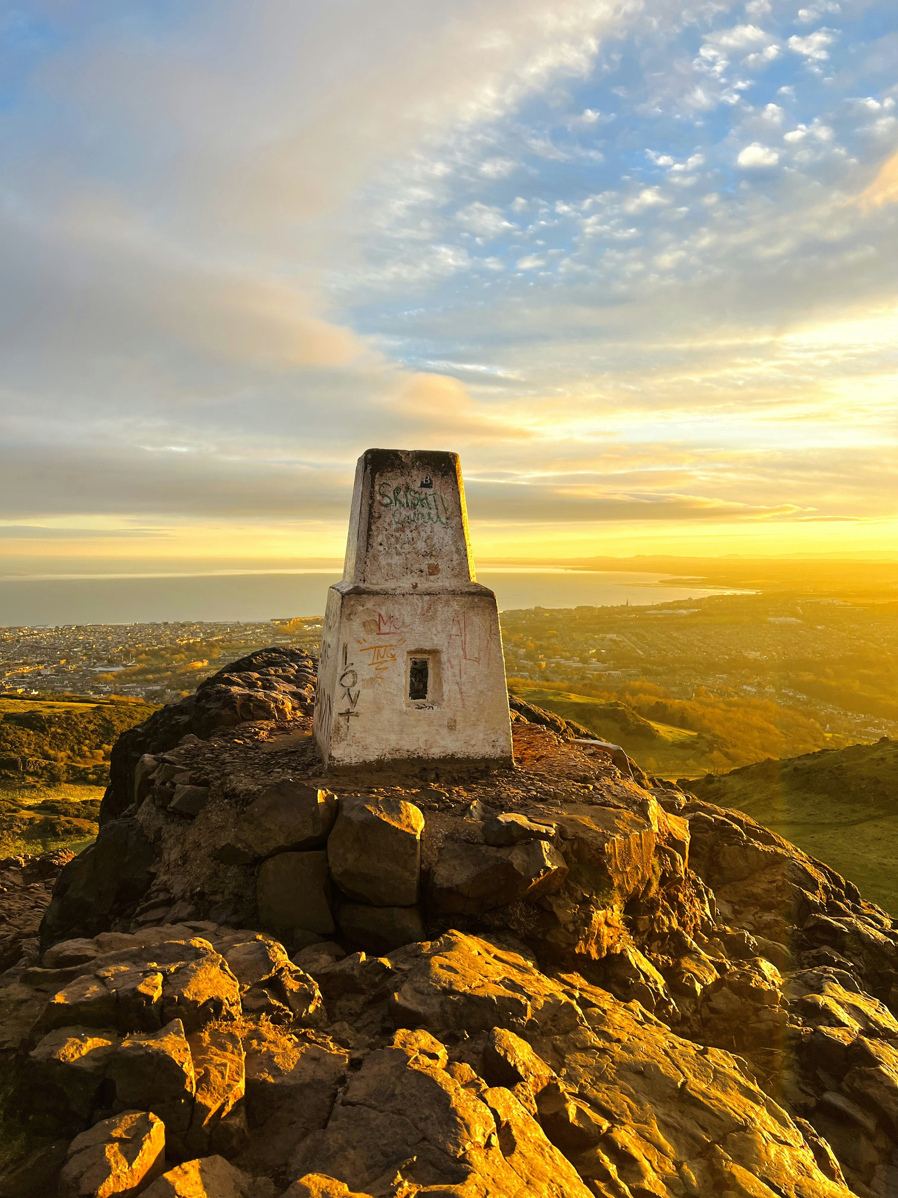 A small monument sitting on top of a rocky hill photo – Free Edinburgh ...