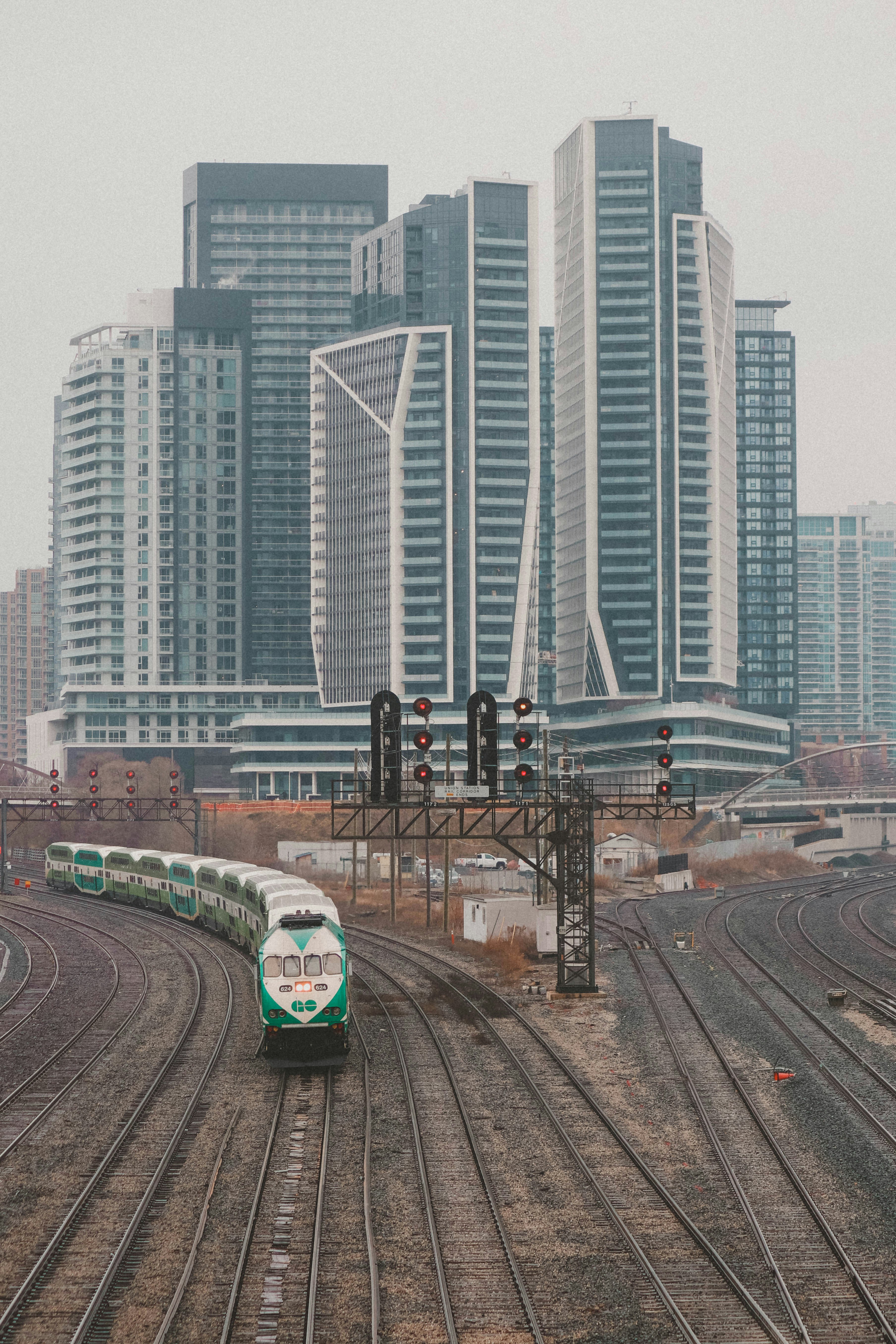 Curved Rails to Skyward Glass: A Commuter Train in a Futuristic City