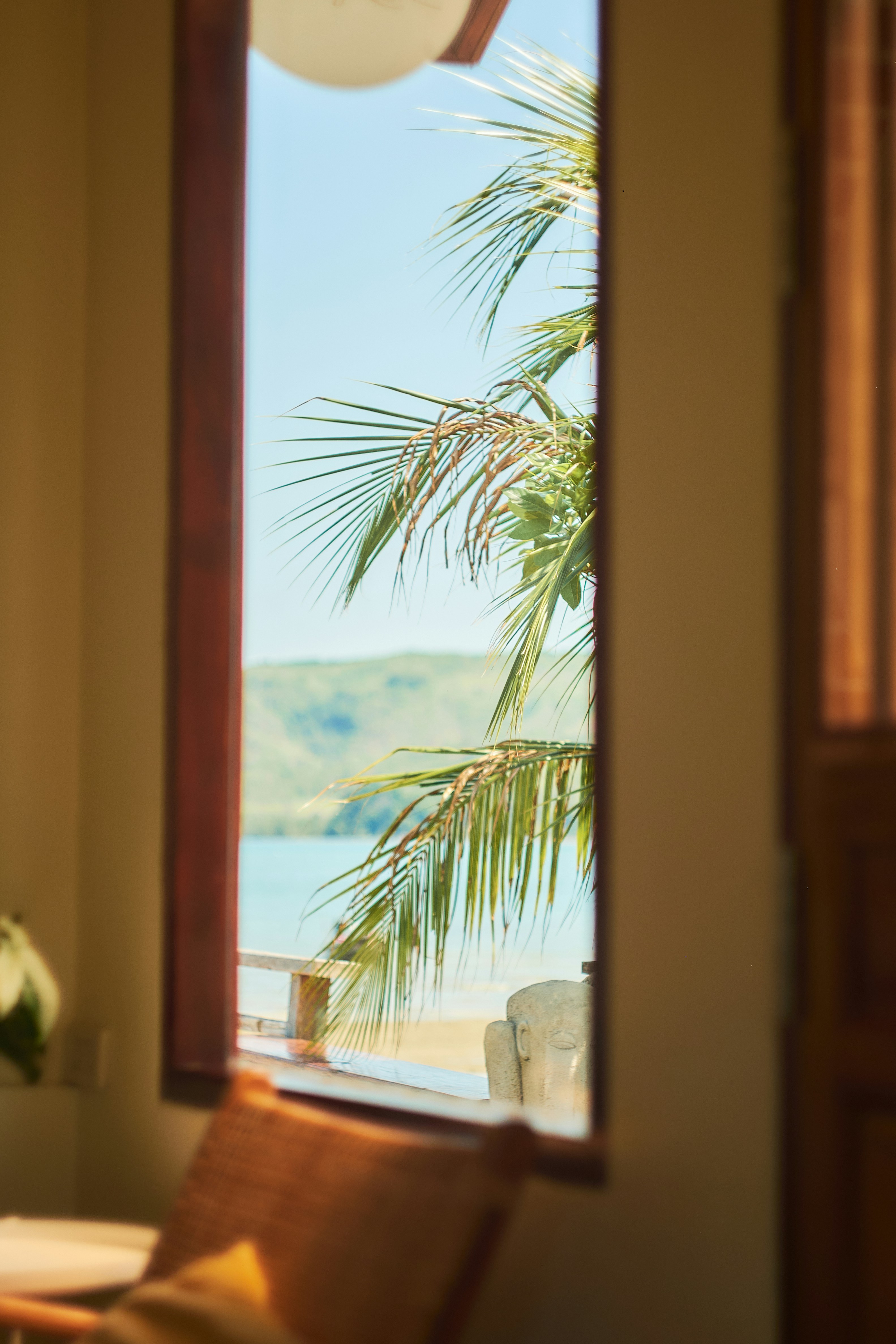 Azure View Through a Warm Interior Window