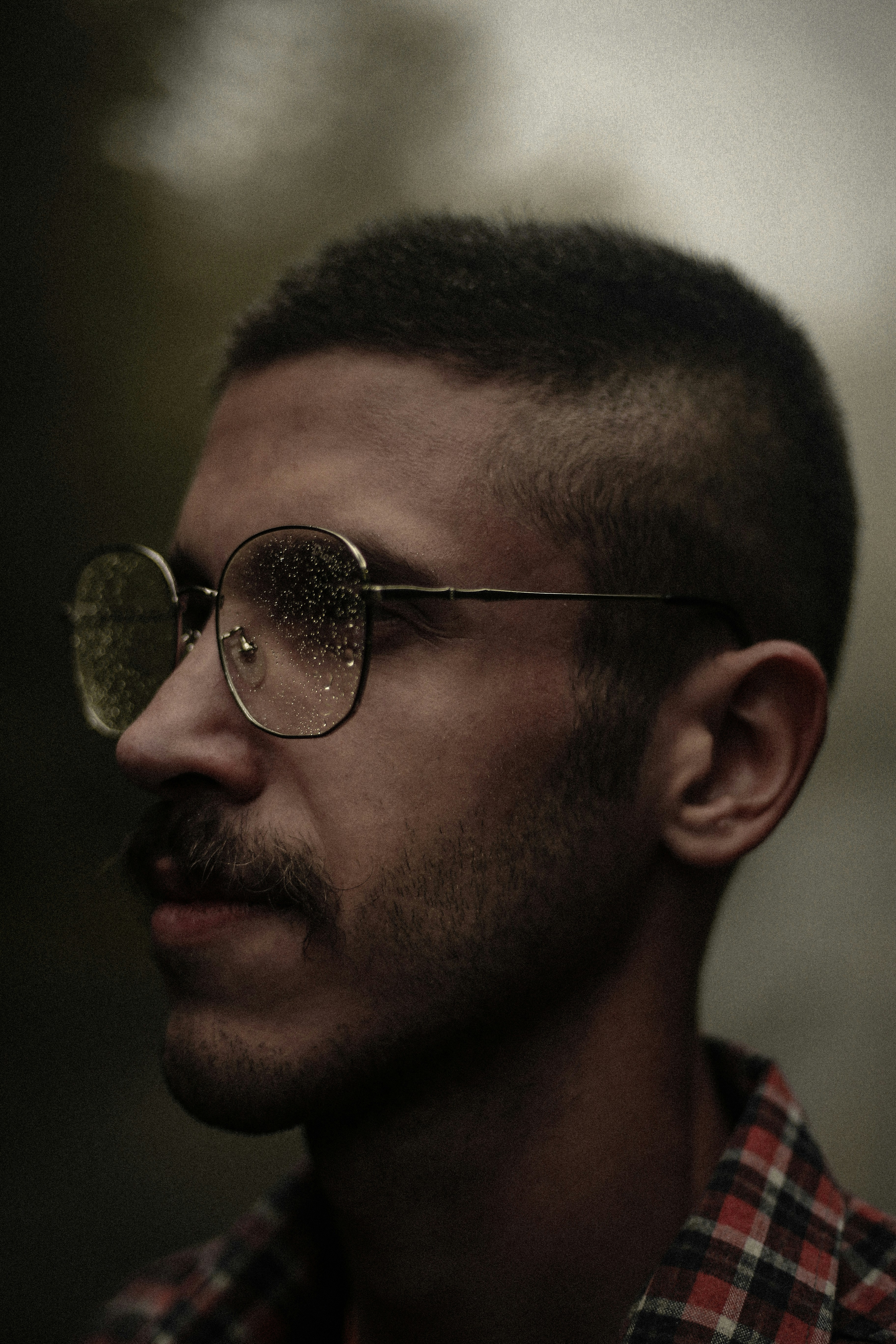 Rain-Kissed Gaze: A moody profile through speckled lenses