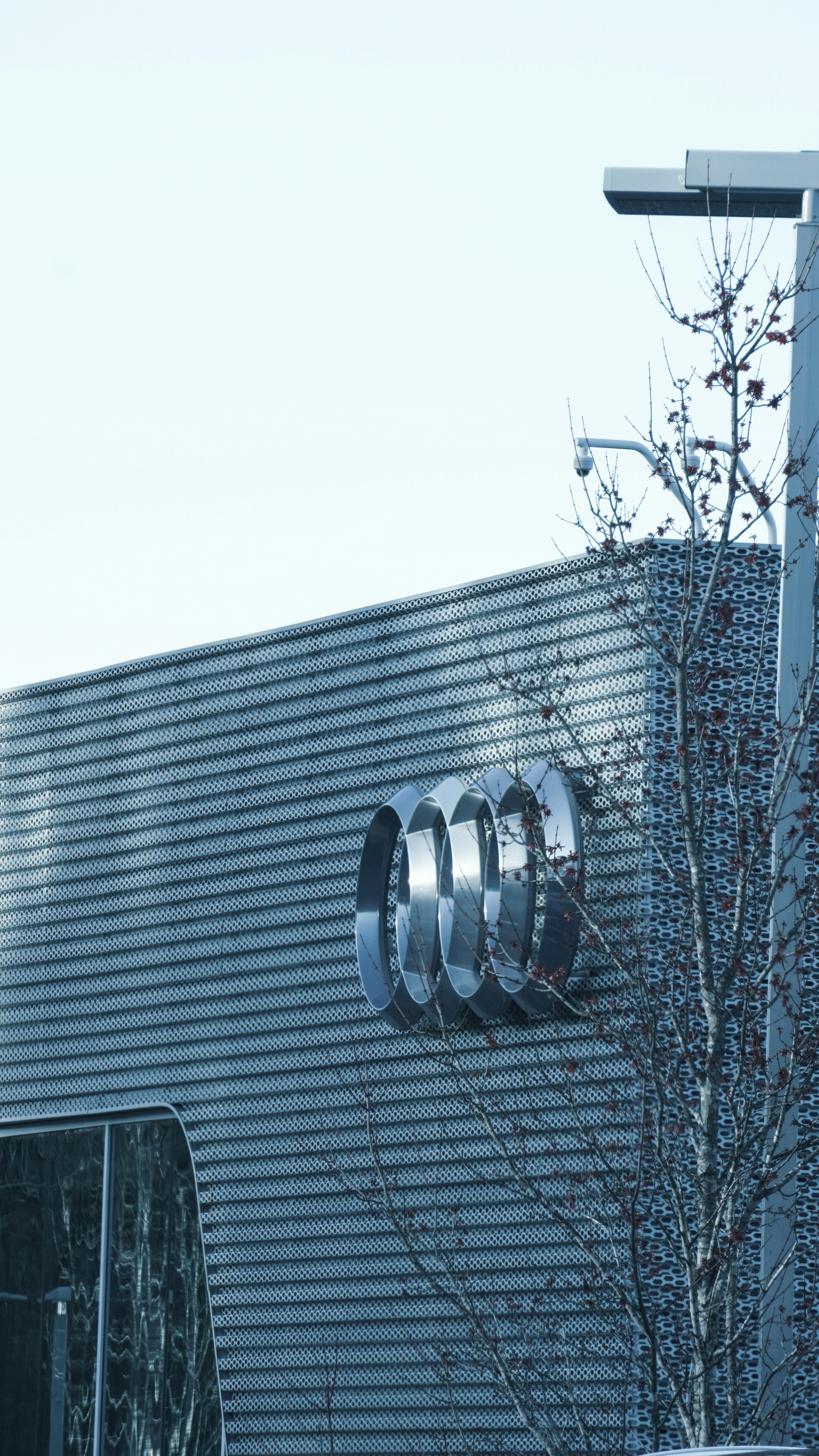 Chrome Rings on a Modern Facade