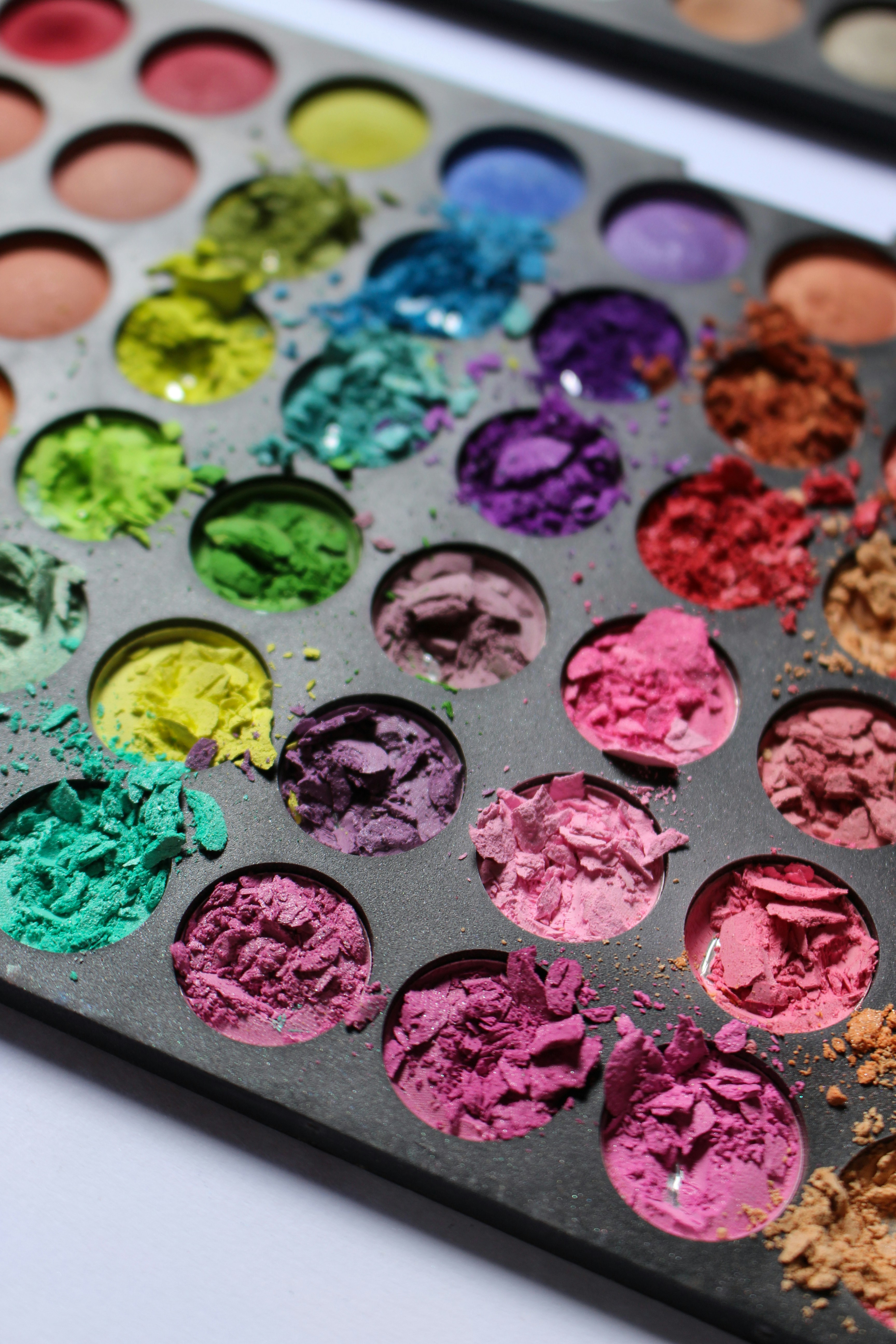 A close up of a palette of paint photo – Free Product photography Image ...