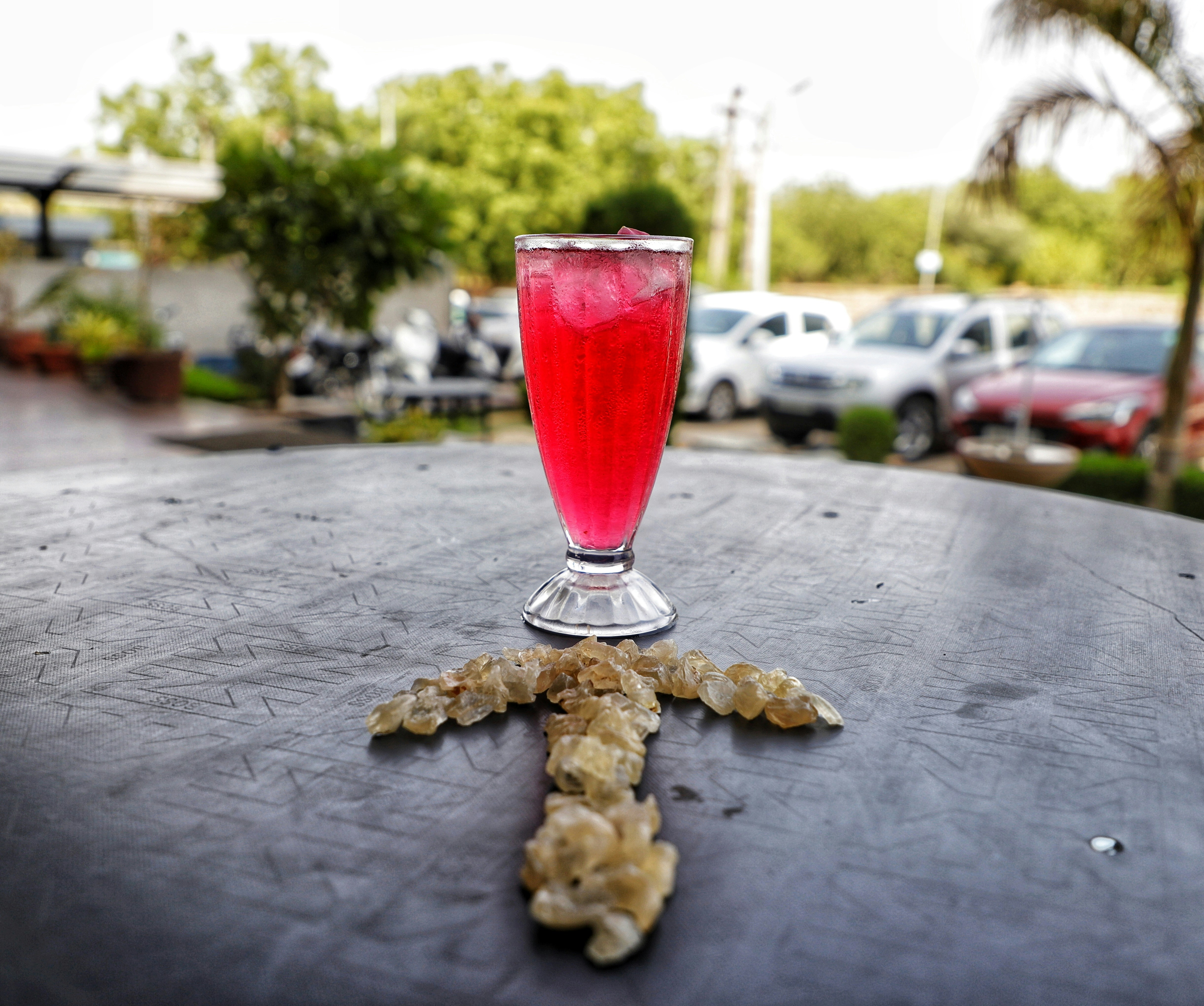 Crimson Cocktail on a Cross of Sugar Crystals