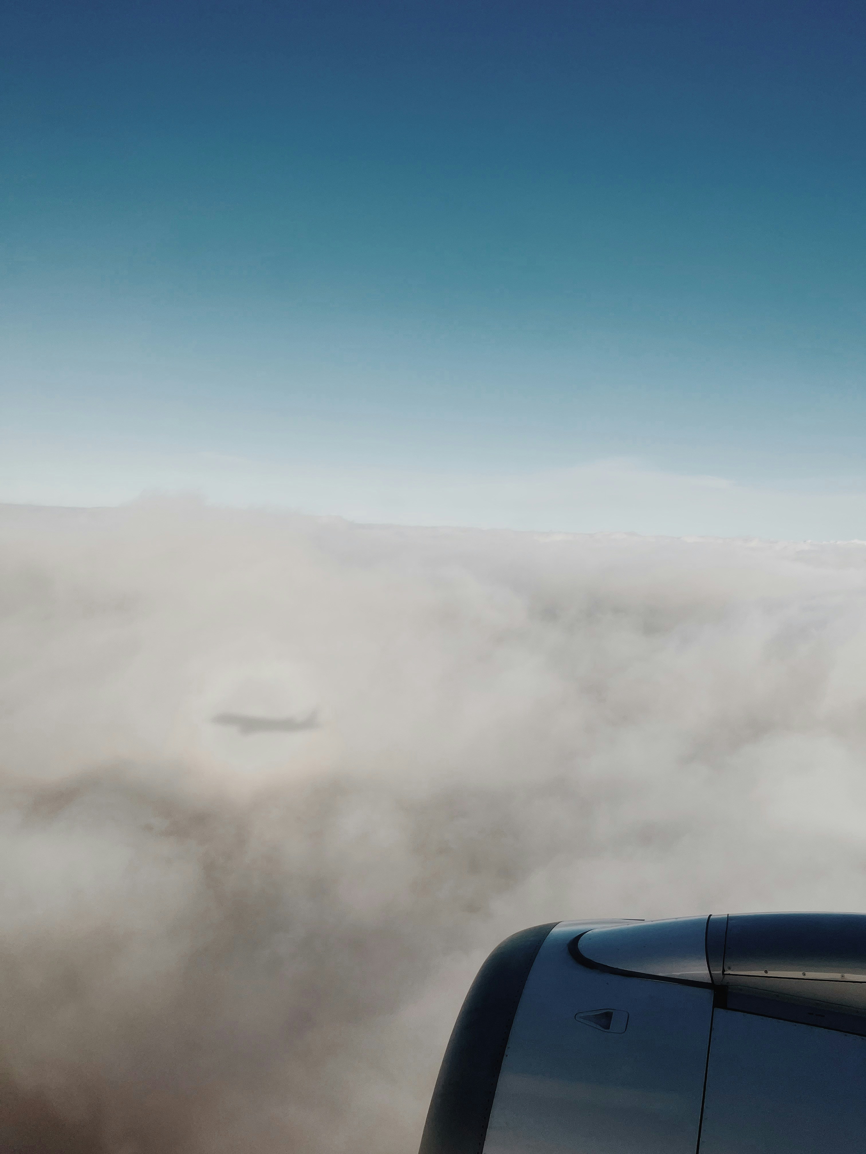 a view of the clouds from an airplane window