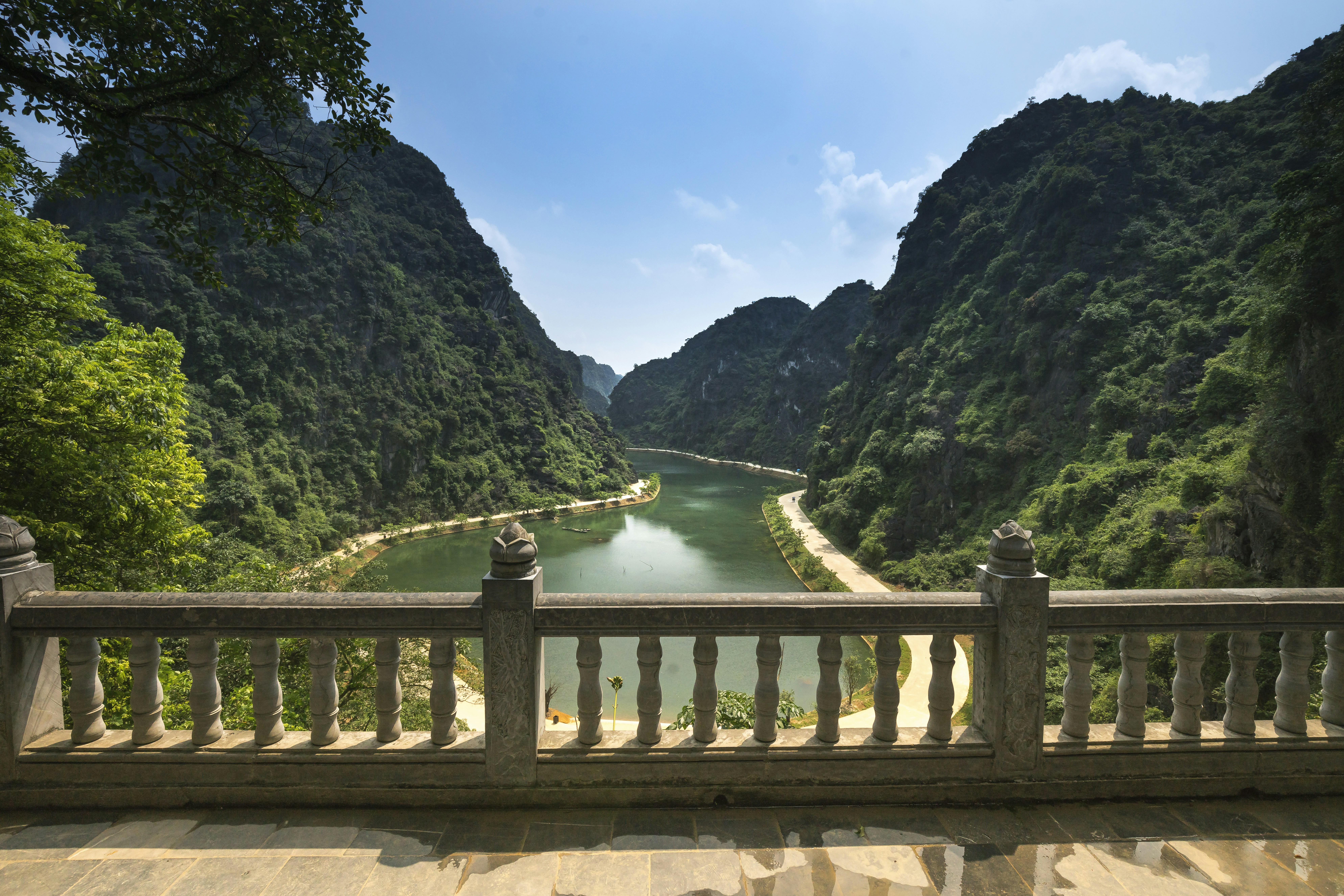 Balcony Vista: A Serpentine River Between Verdant Cliffs