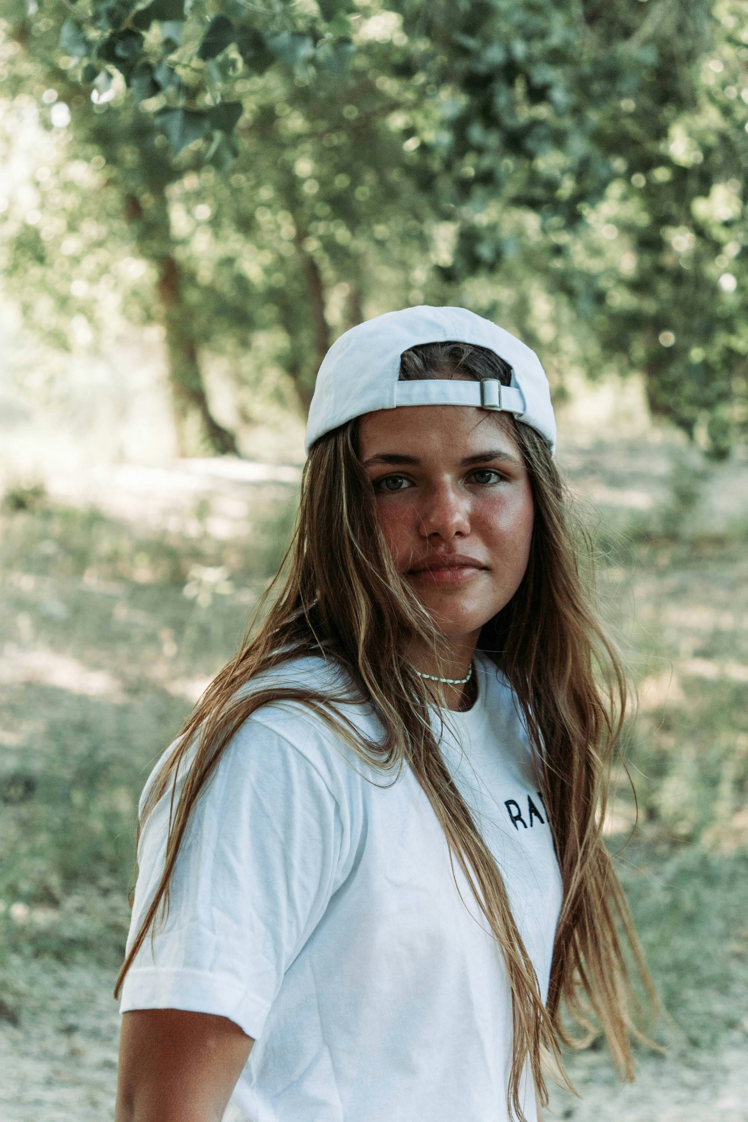 Girls Wearing Baseball Caps Backwards