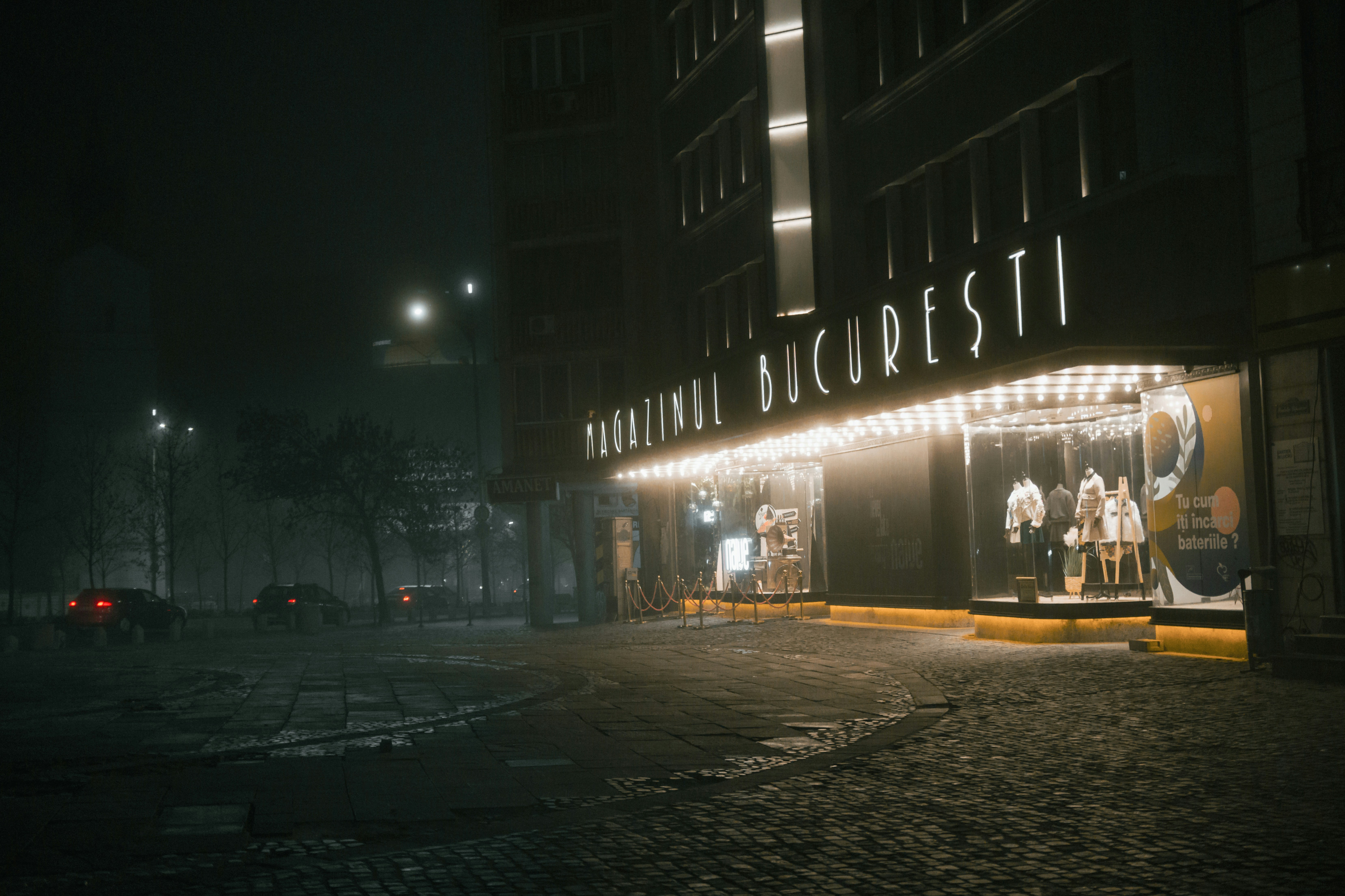 Warm Window Glow on a Cobblestone Night