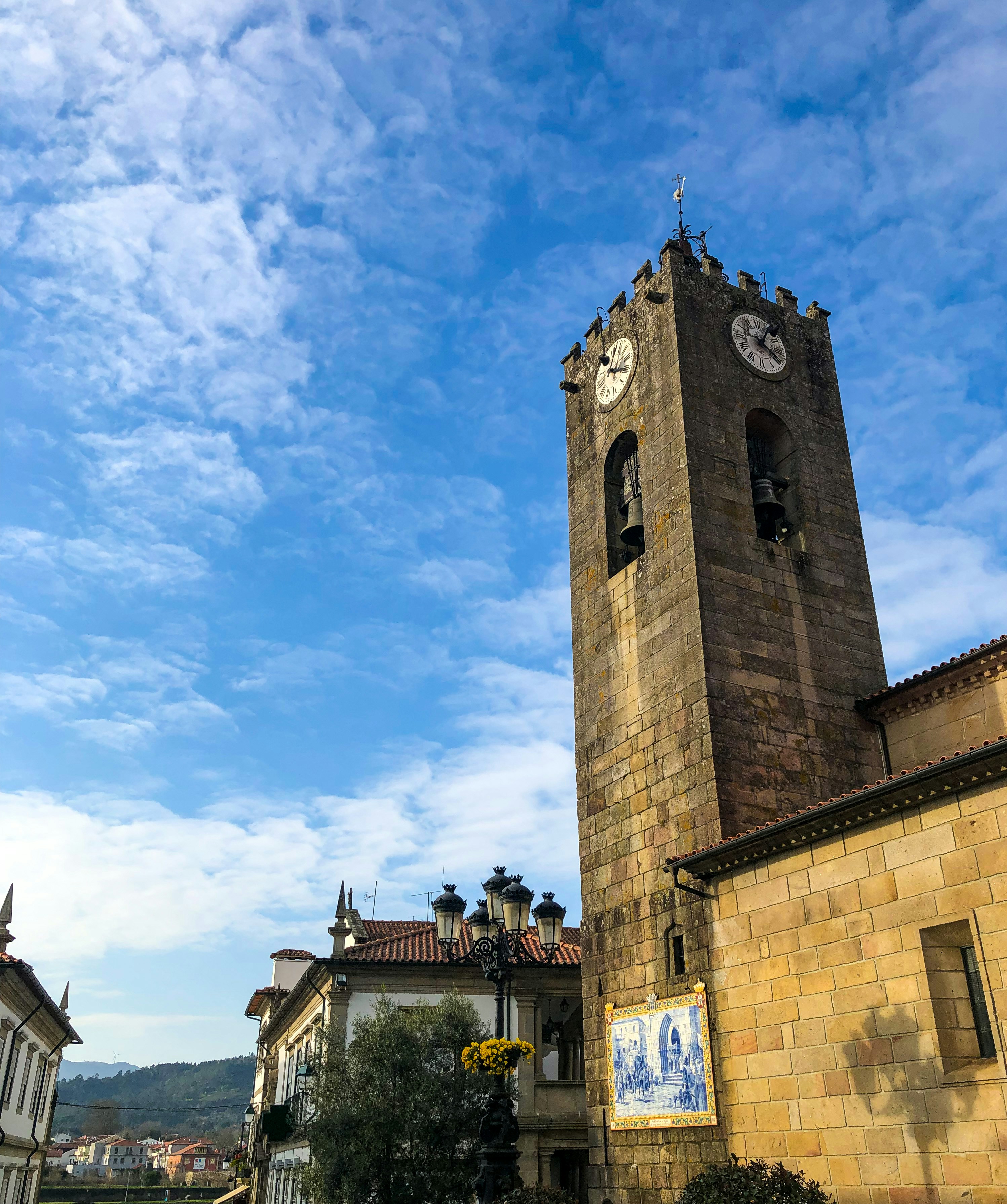 A tall clock tower towering over a city photo – Free Ponte de lima ...