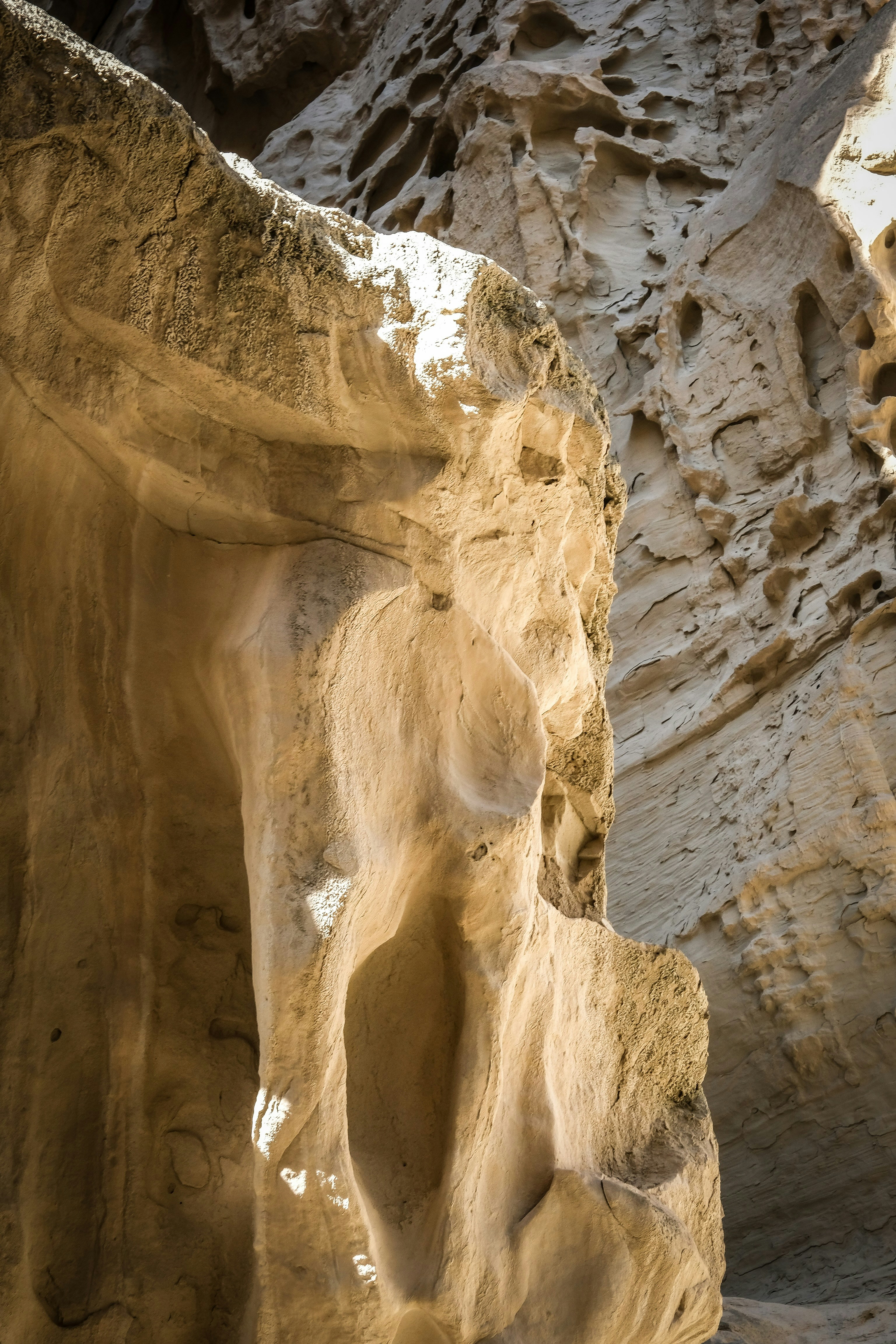 A large rock formation with a person standing on it photo – Free Nature ...