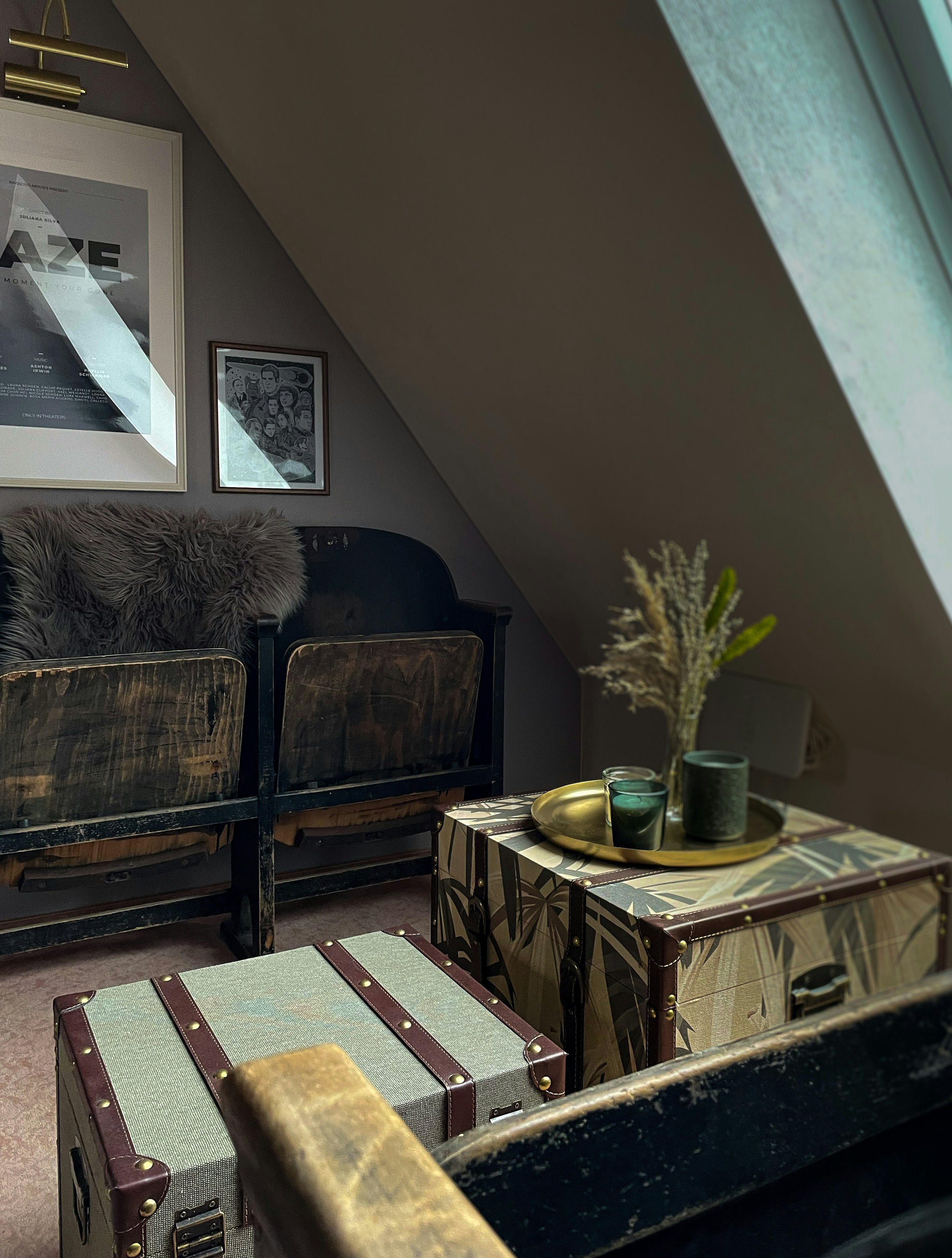 Old cinema chairs as a seating area.