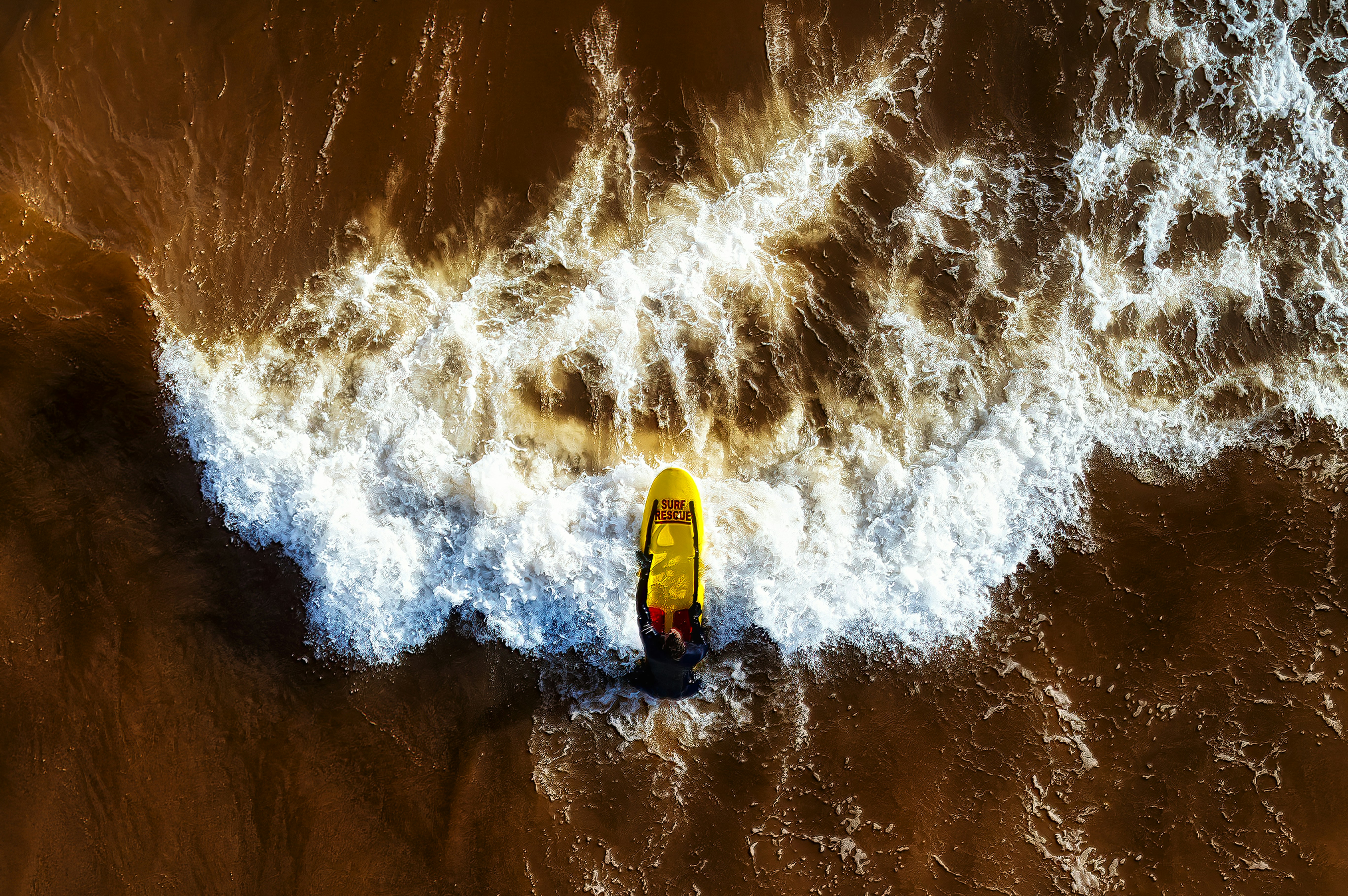 An aerial view of a surfboard in the water photo – Free Orcombe point ...