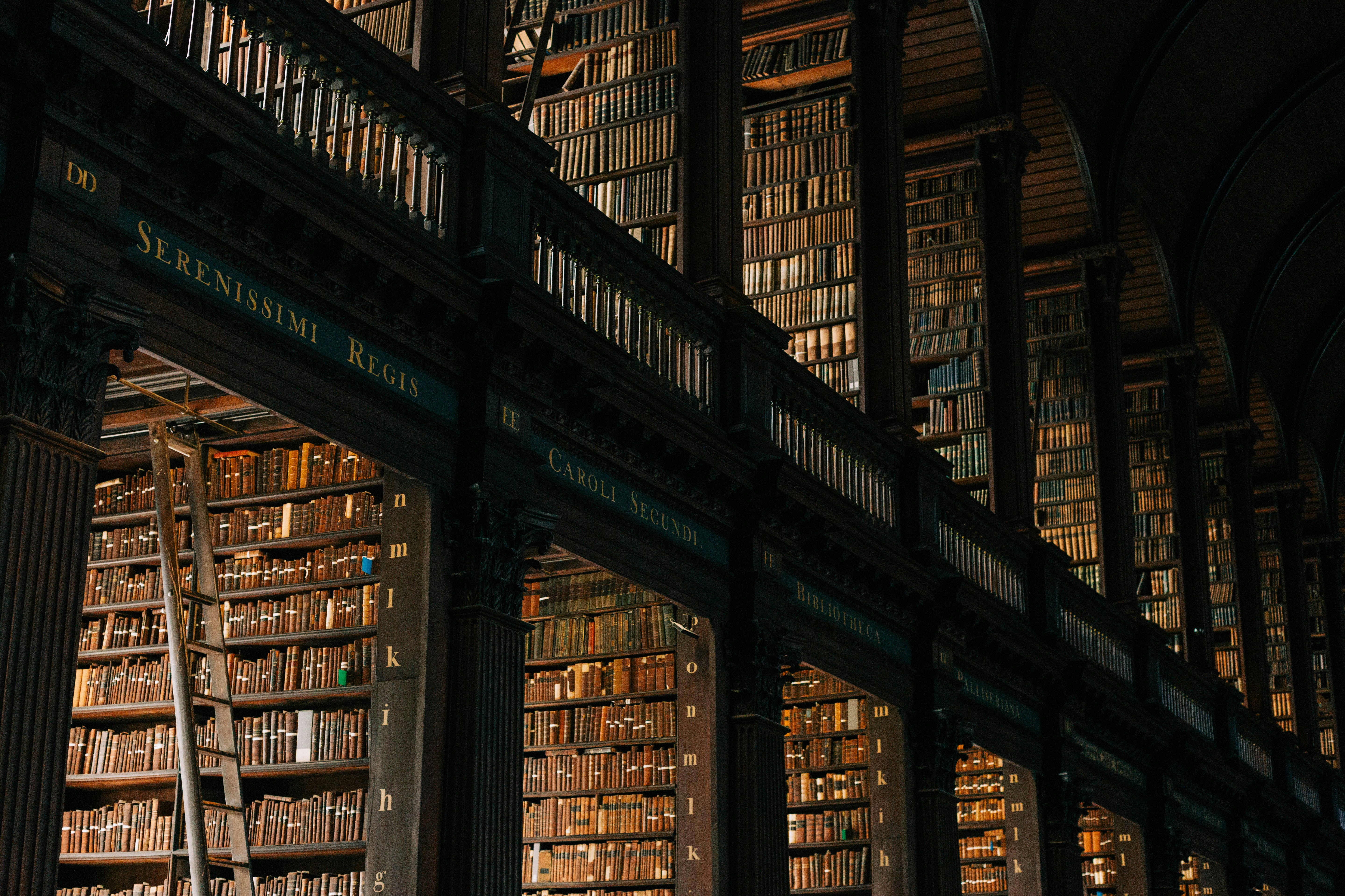 A large library filled with lots of books photo – Free Trinity college ...
