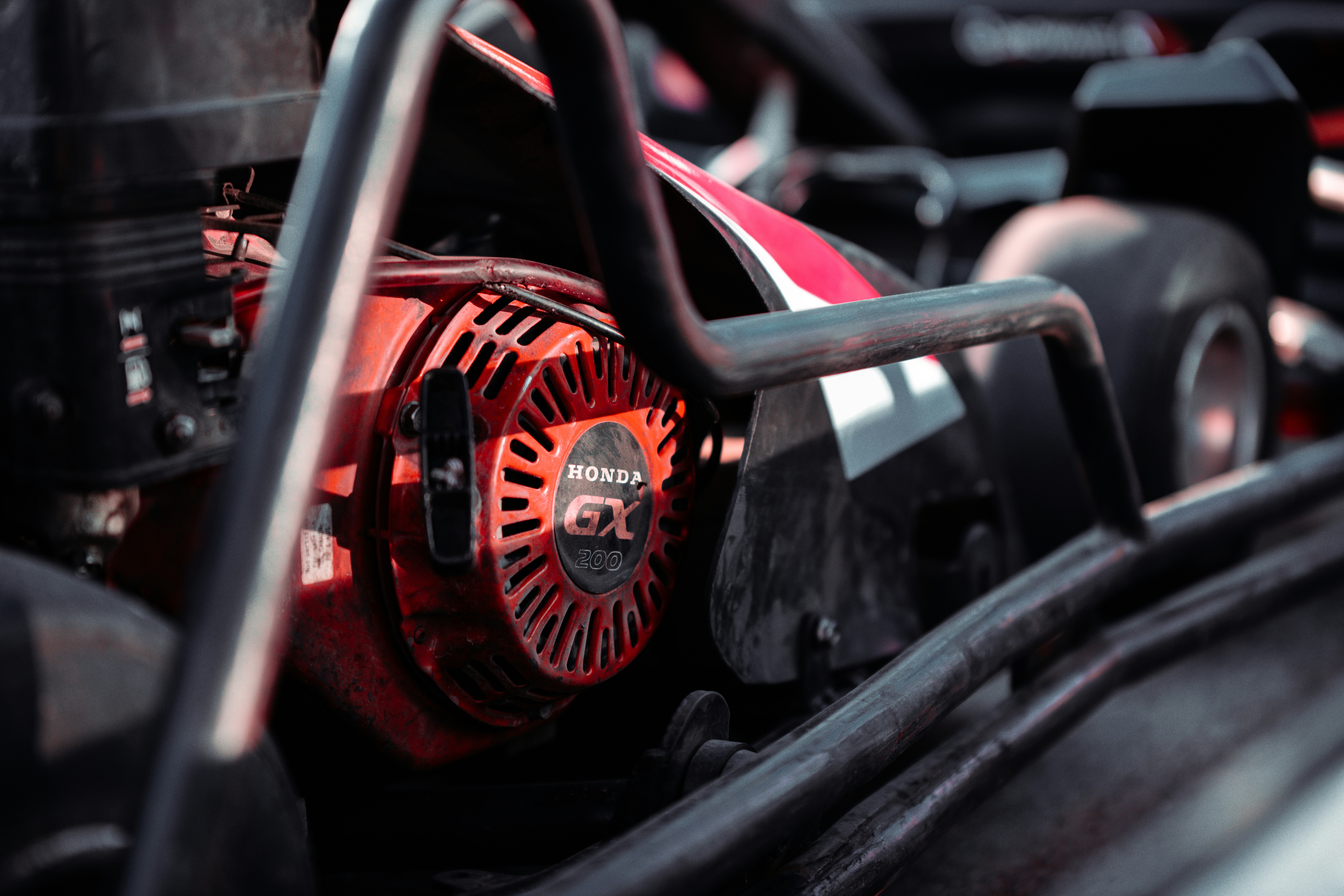 A close up of a red and black engine photo – Free Engine Image on Unsplash