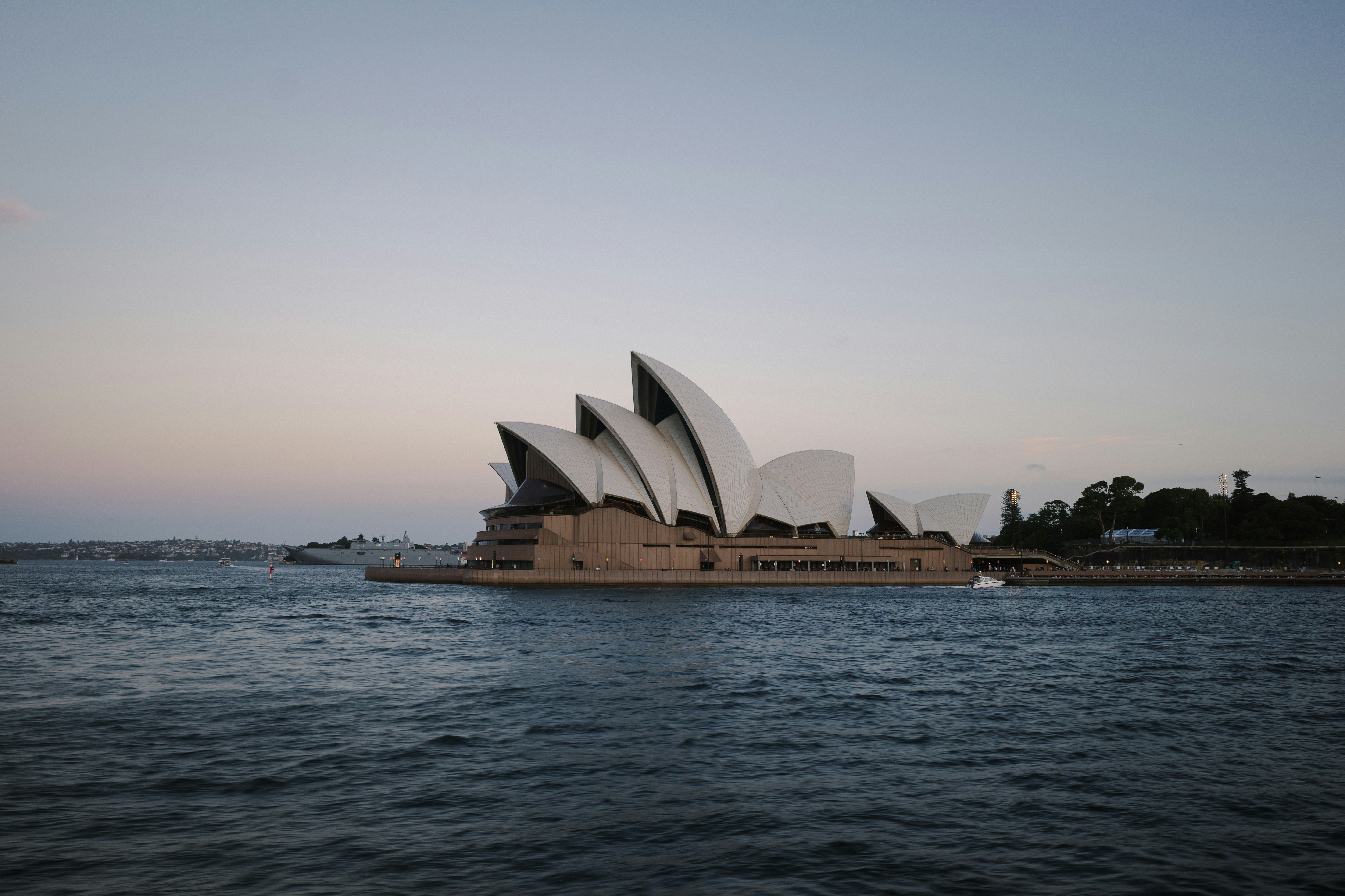 The sydney opera house in the middle of a body of water photo – Free ...