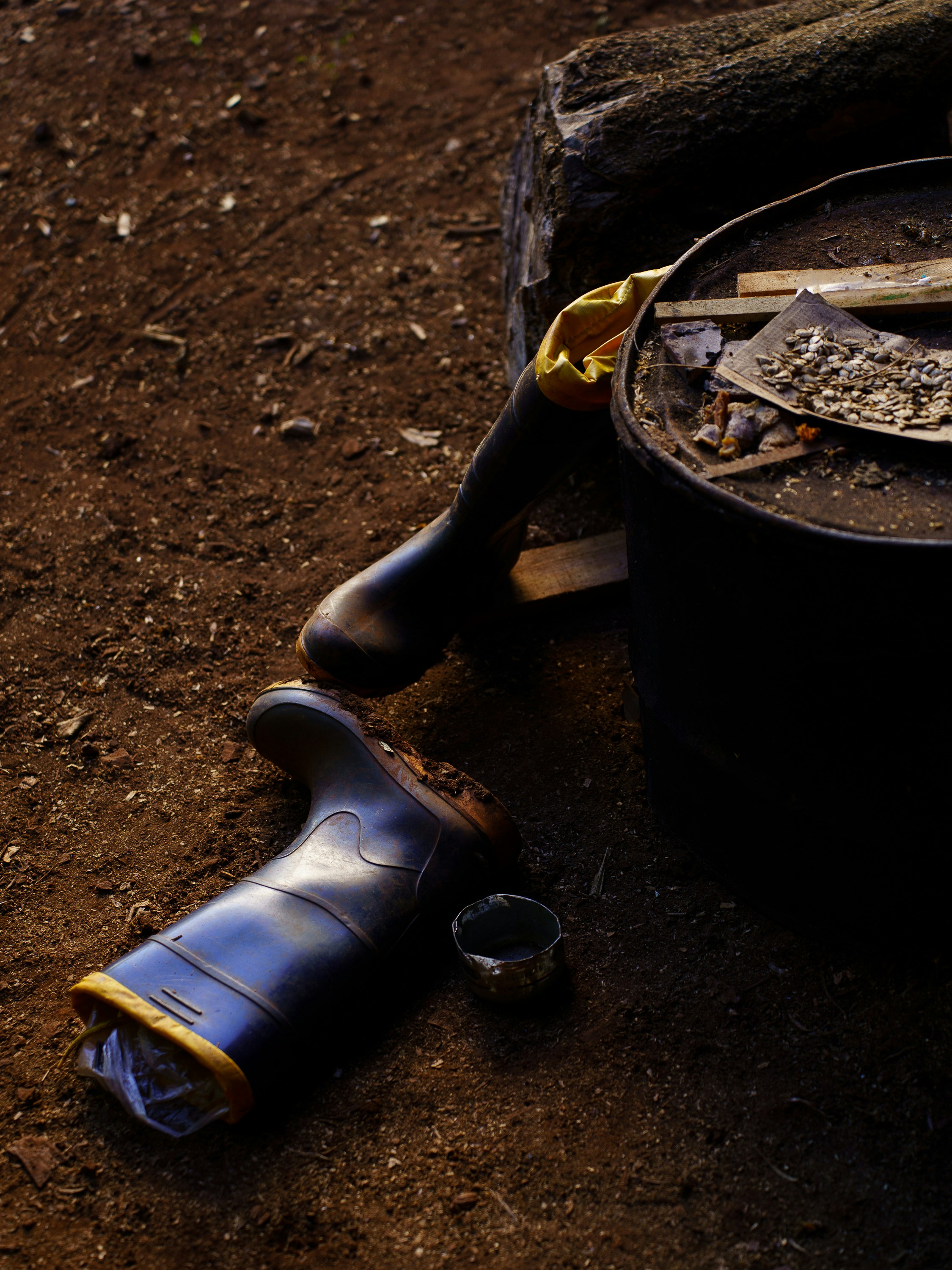 Ember Barrel and Mud-Streaked Boots