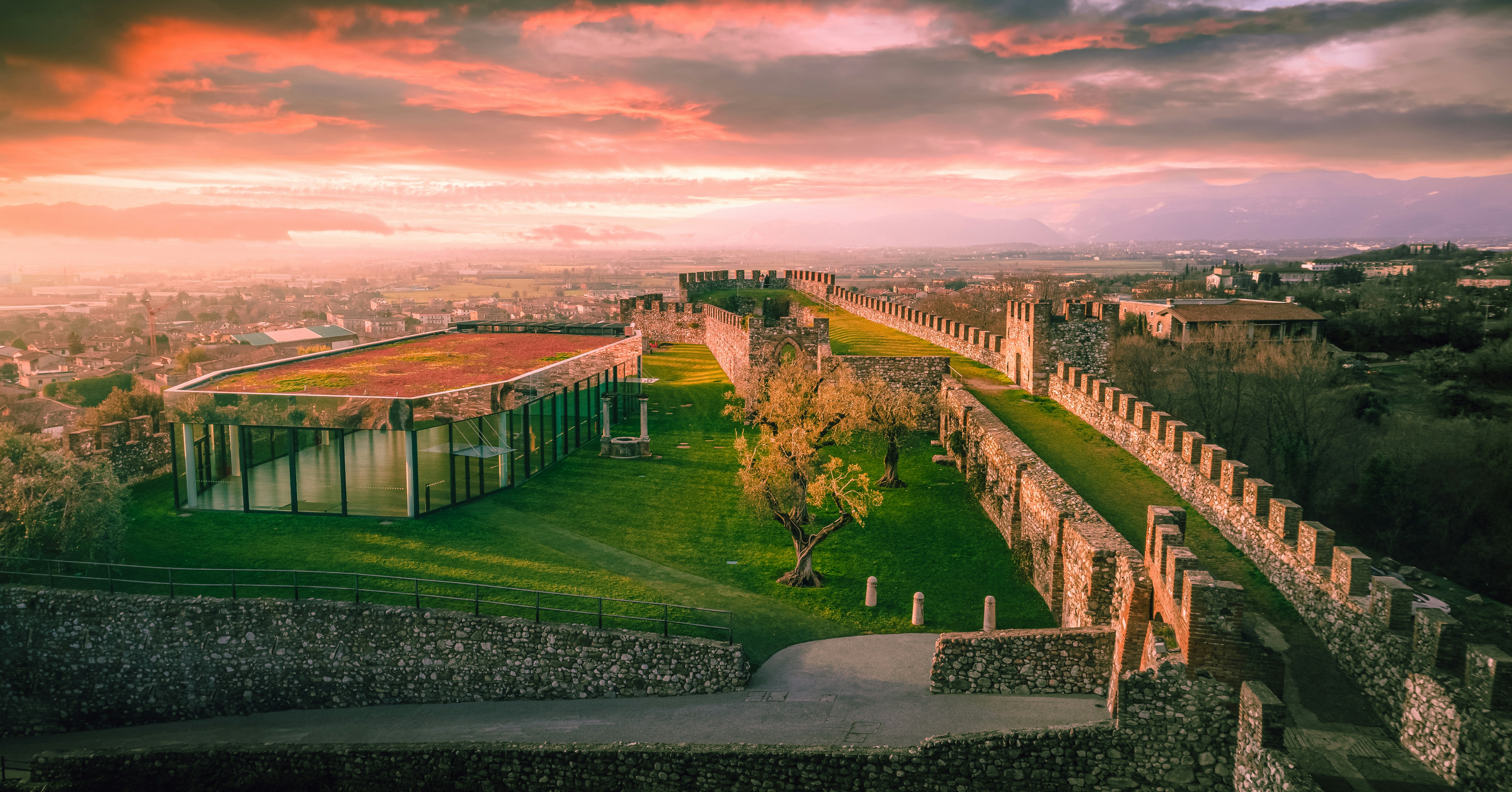 Rising Sun Over Ancient Walls: A Sunset Panorama at the Fortress