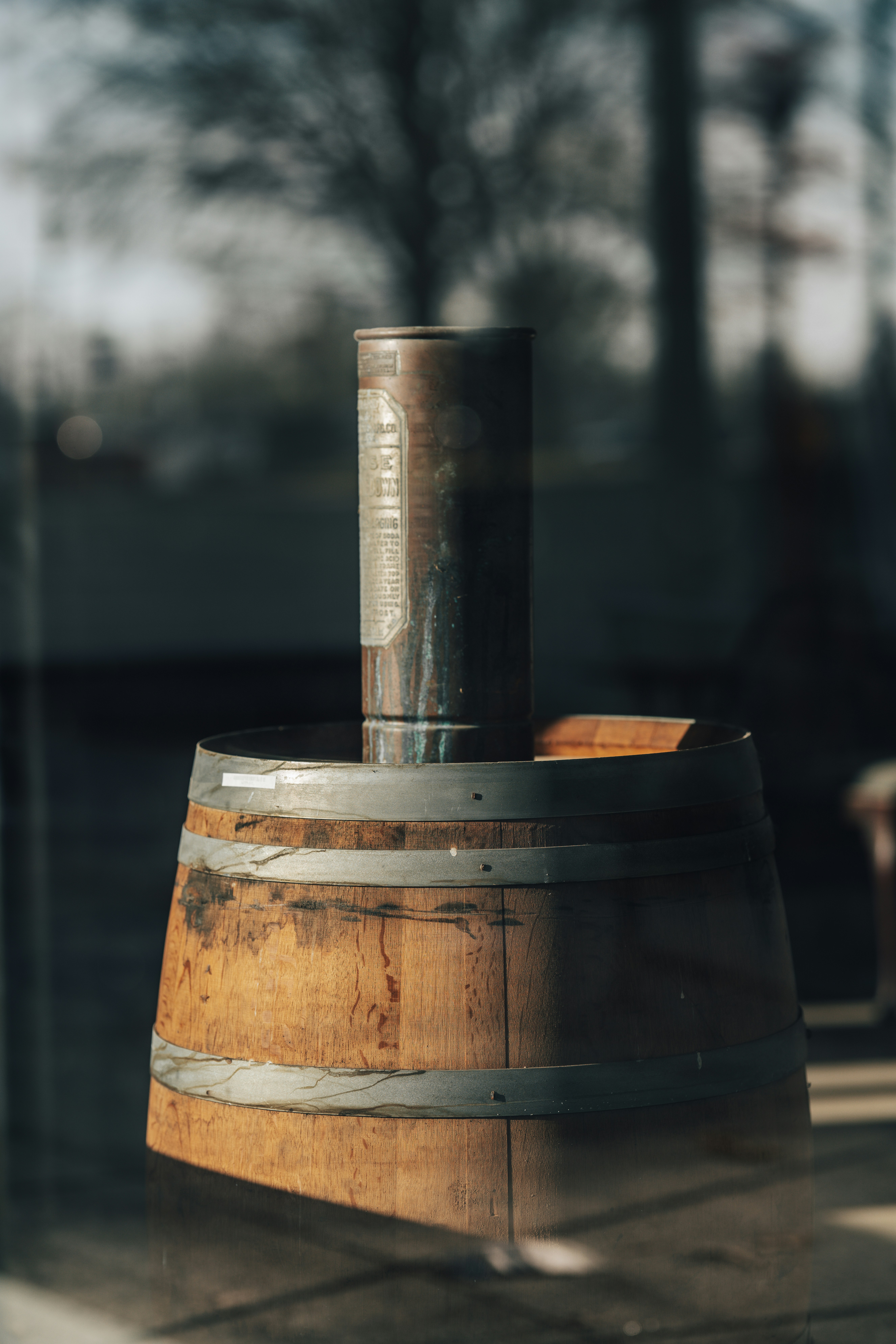 Cask Crowned with Steel: A Still Life of Wood and Metal
