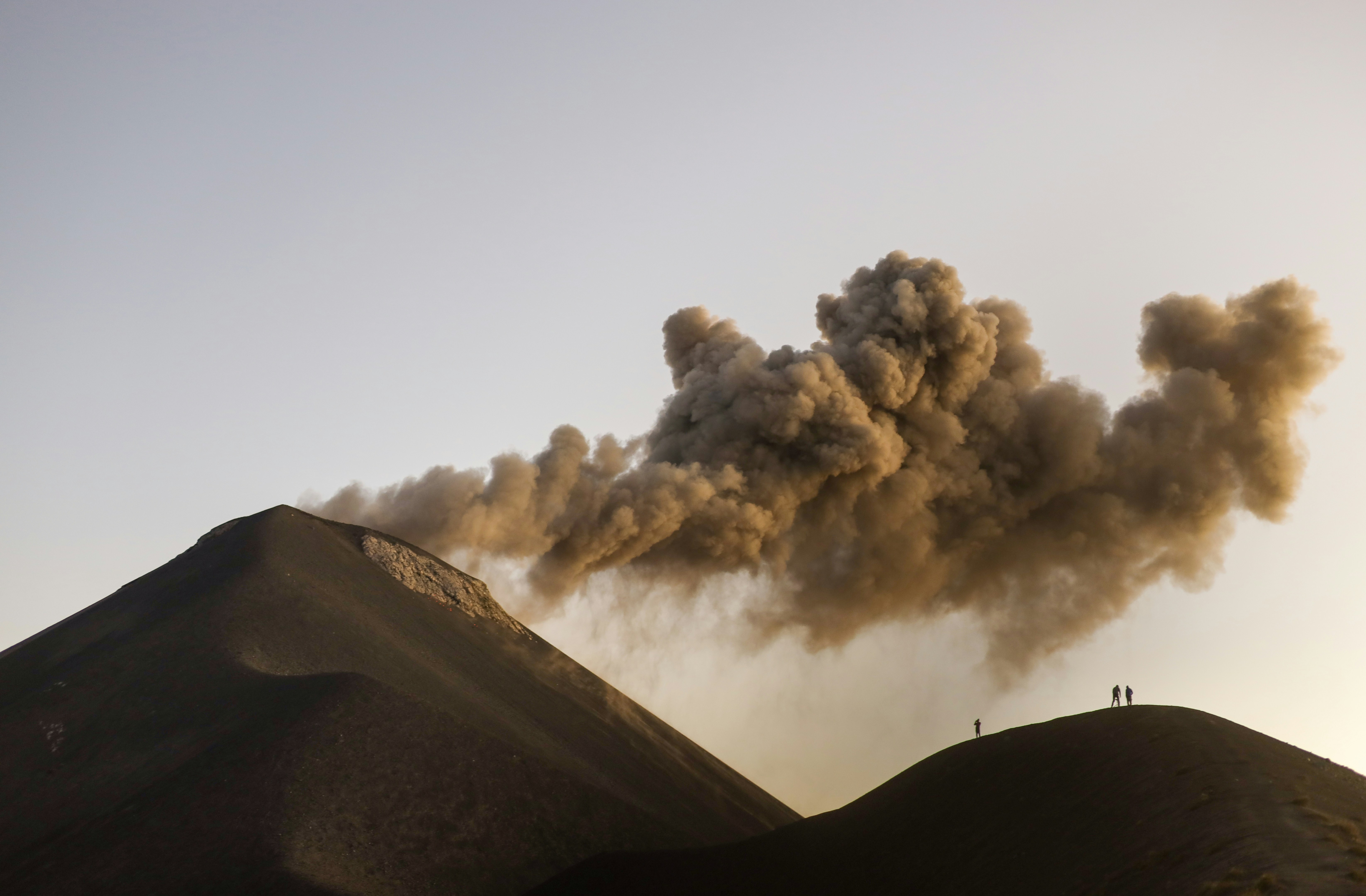 Smoke billows from the top of a mountain photo – Free Fuego Image on ...