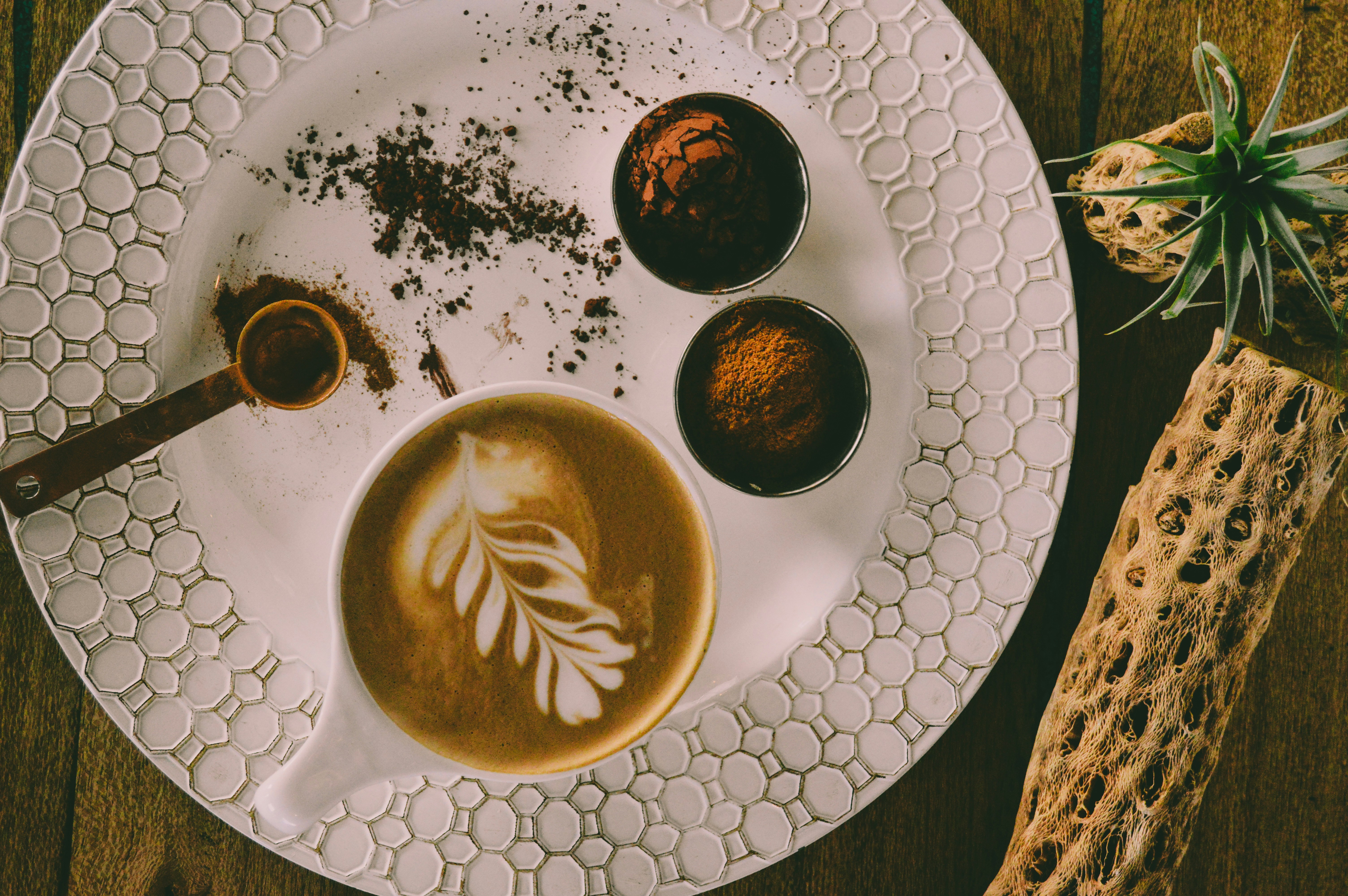 A white plate topped with a cup of coffee photo – Free Coffee Image on ...
