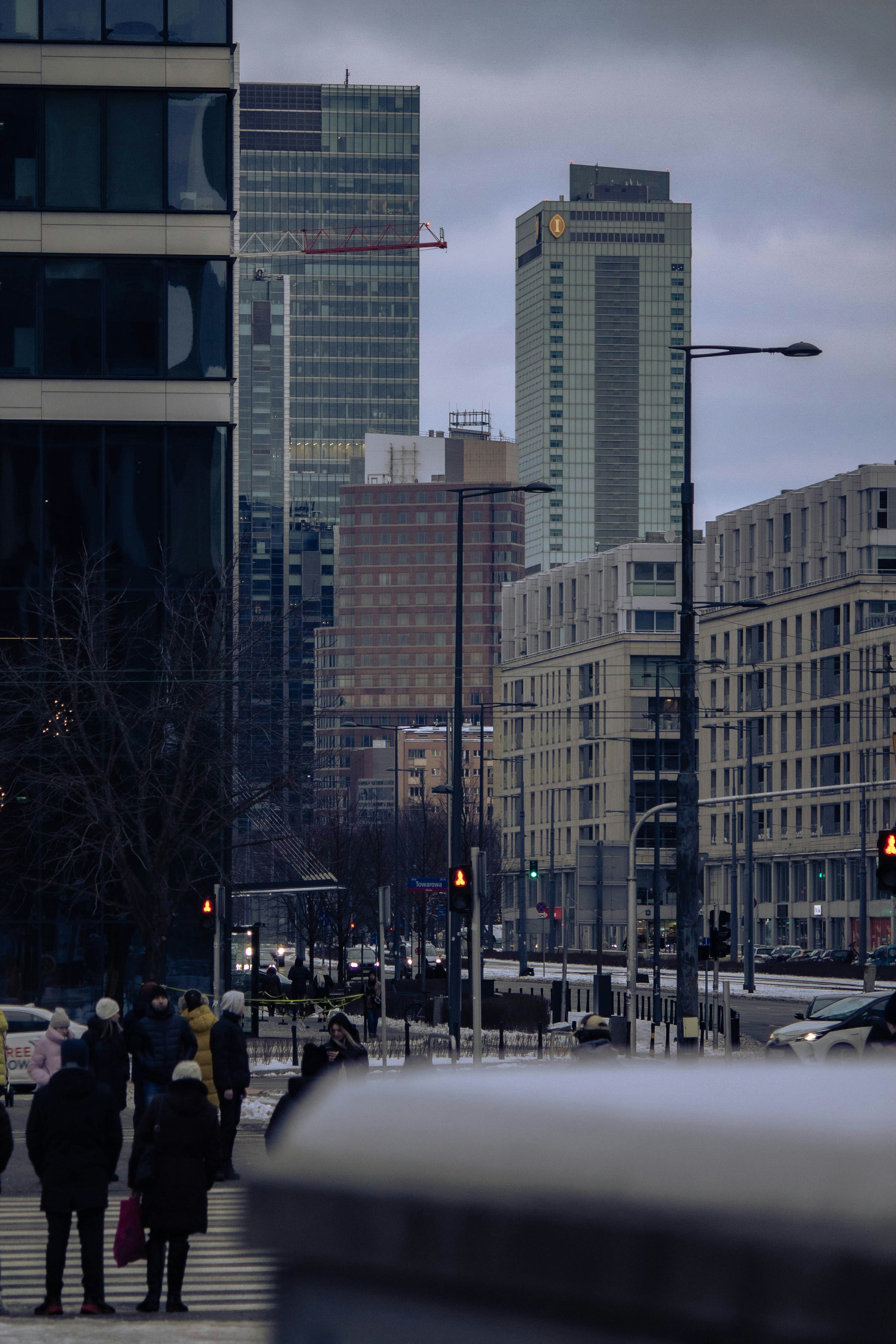 Urban Convergence: A Snowy Day Amid Glass Towers