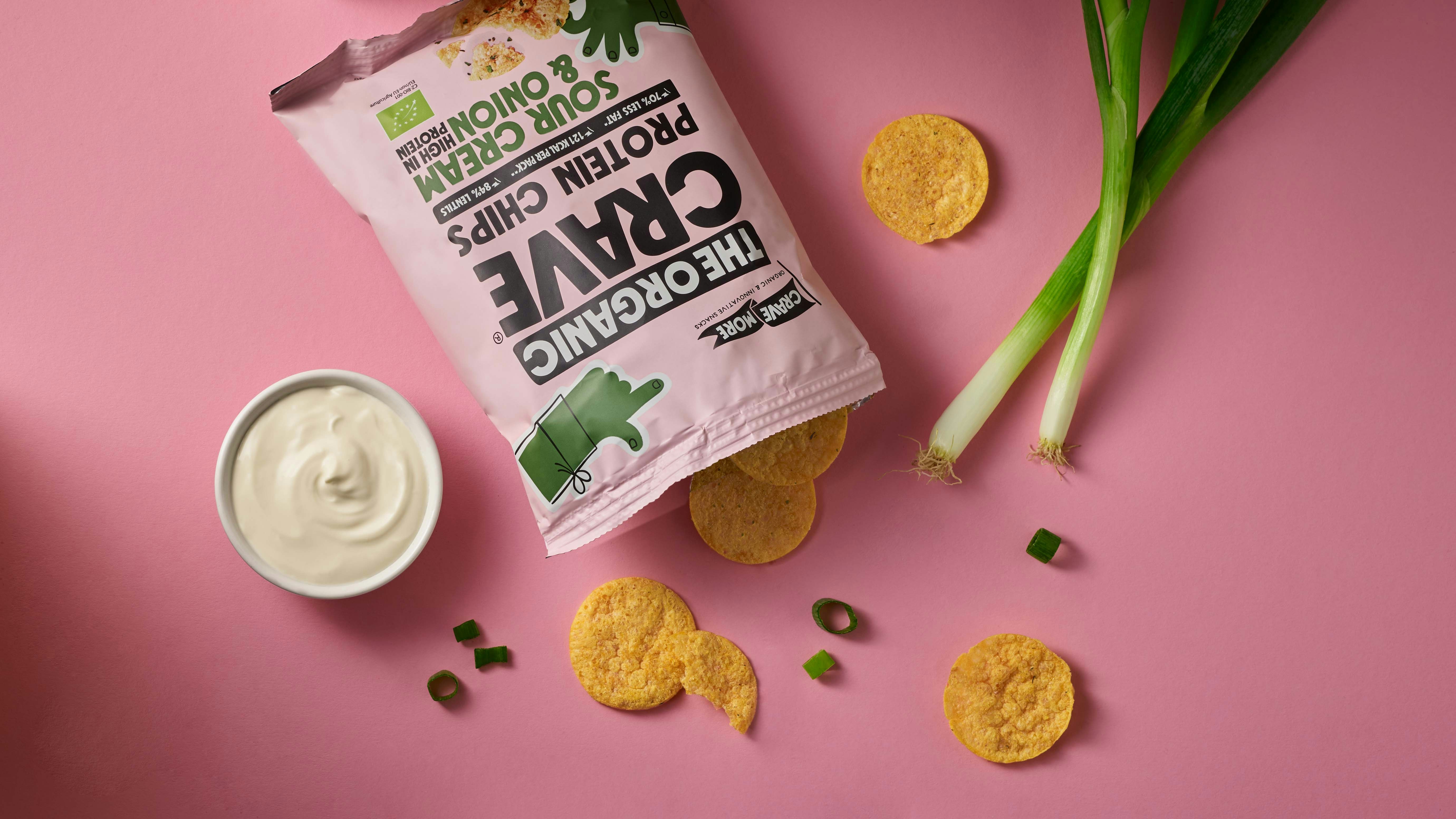 A bag of potato chips next to a bowl of sour cream photo – Free Denmark ...