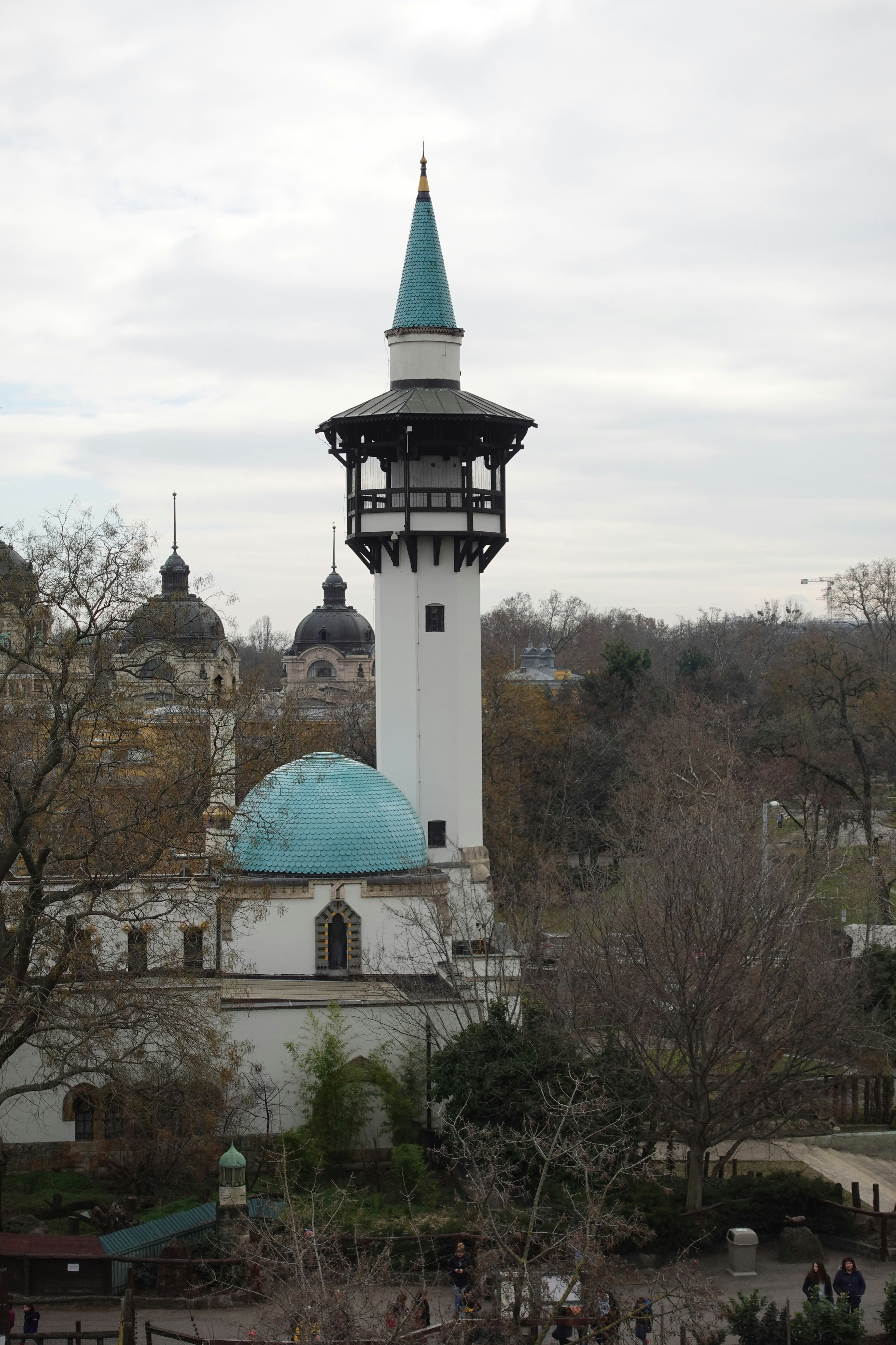 Crown of Turquoise: A Timeless Mosque Tower in Winter Light