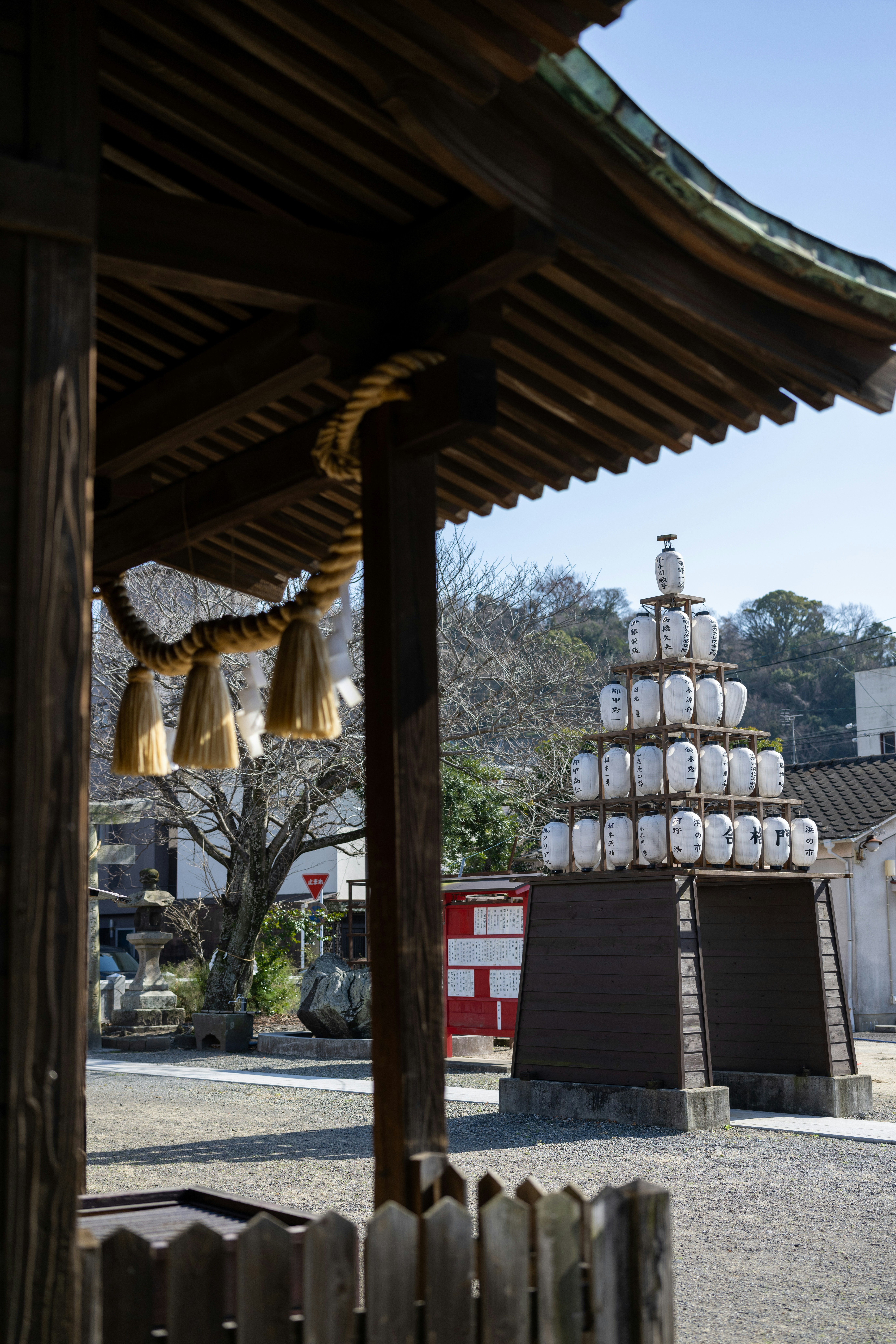 A wooden structure with bells hanging from it photo – Free Building ...