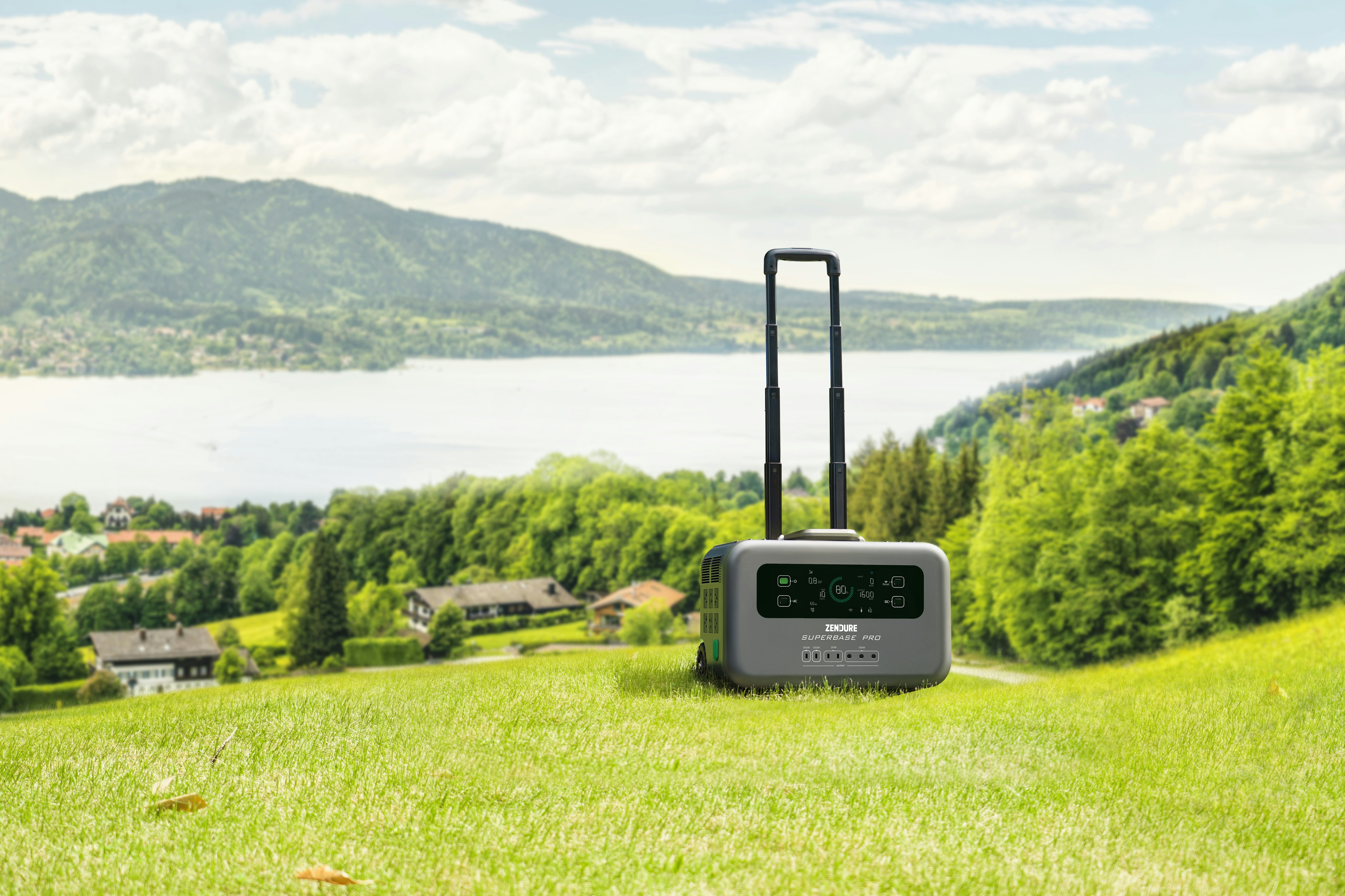A suitcase sitting on top of a lush green hillside photo – Free Solar ...