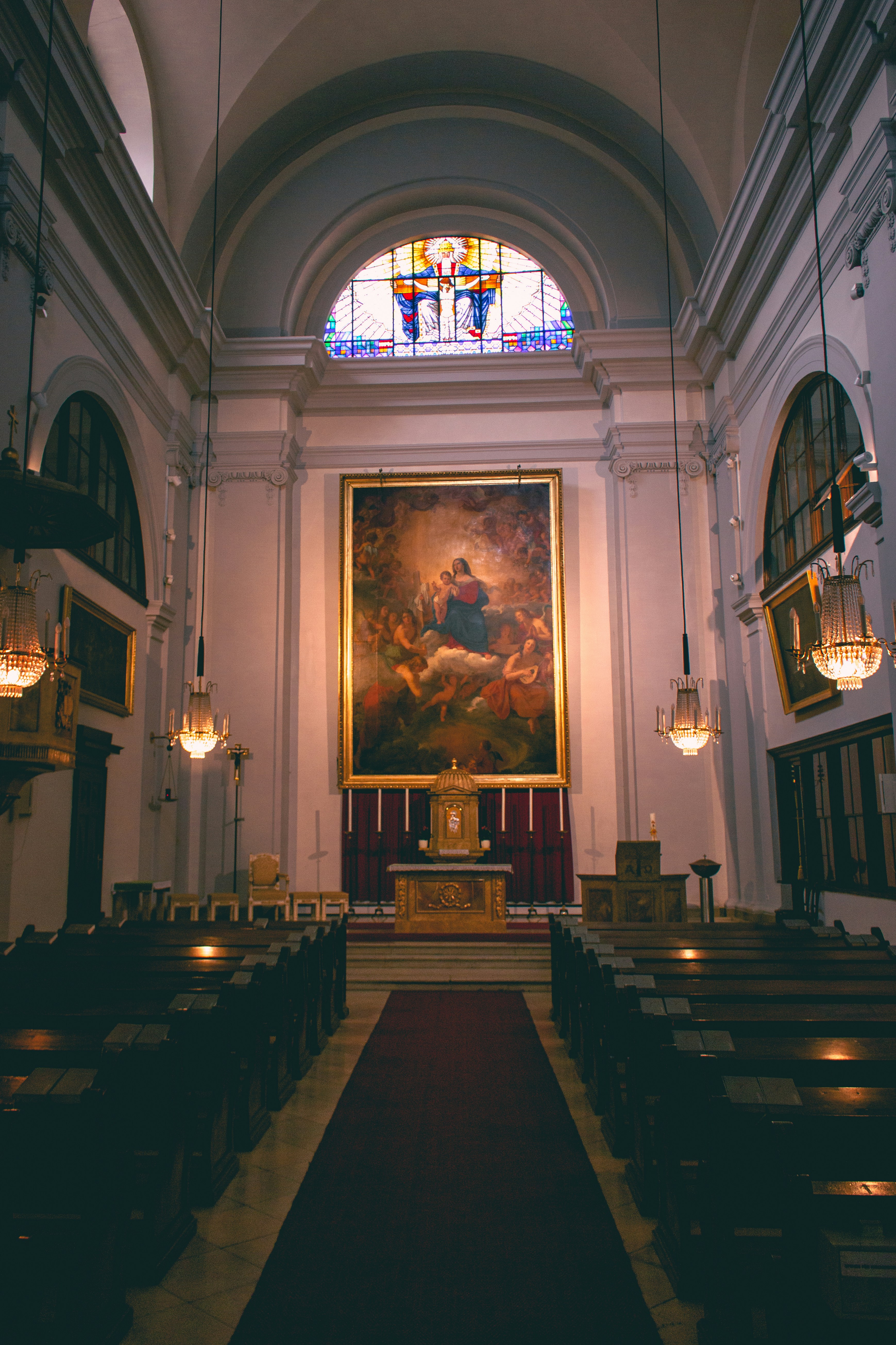Altar Portrait Under Stained Light: A Quiet Cathedral Nave