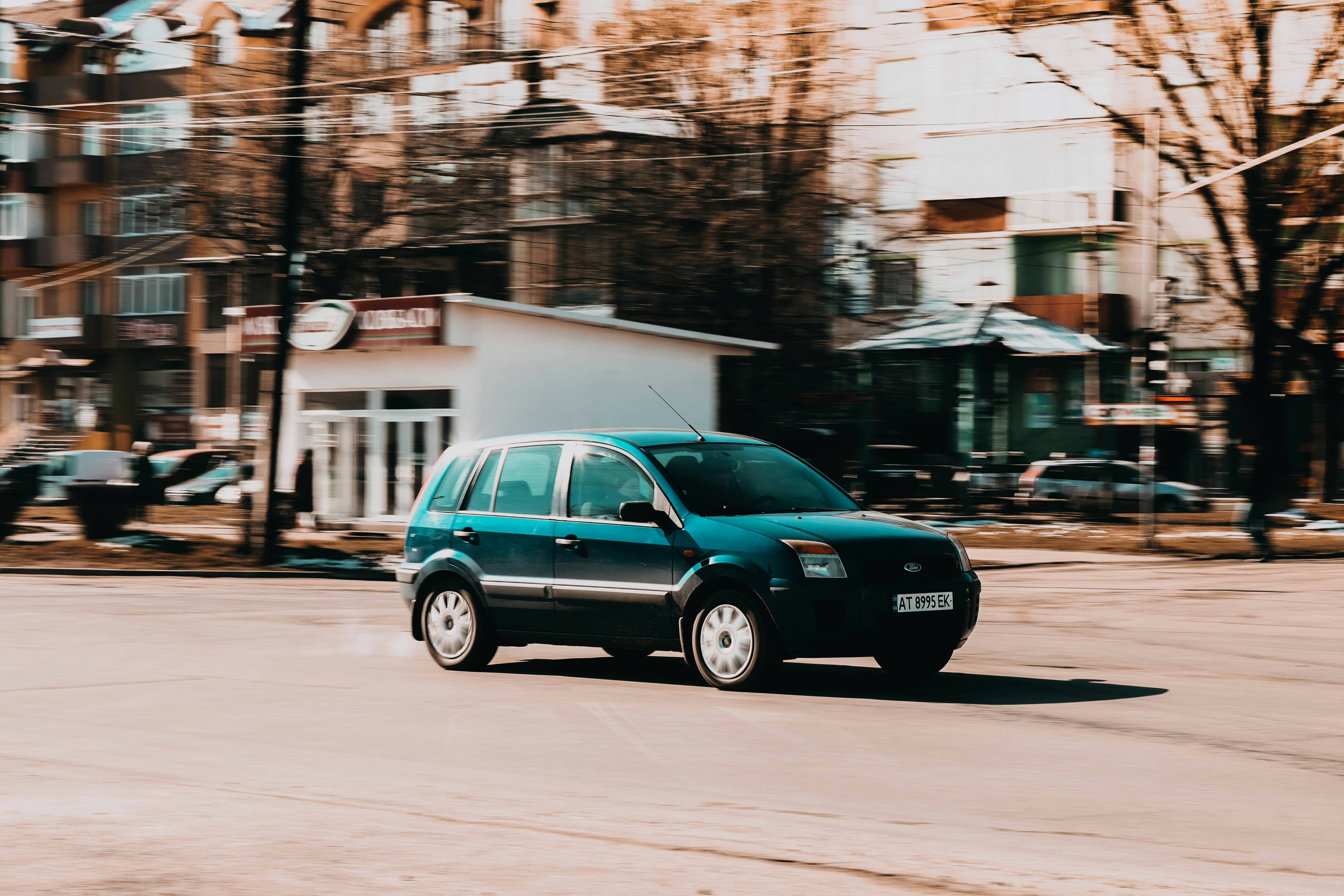Teal City Runabout in a Veil of Motion Blur