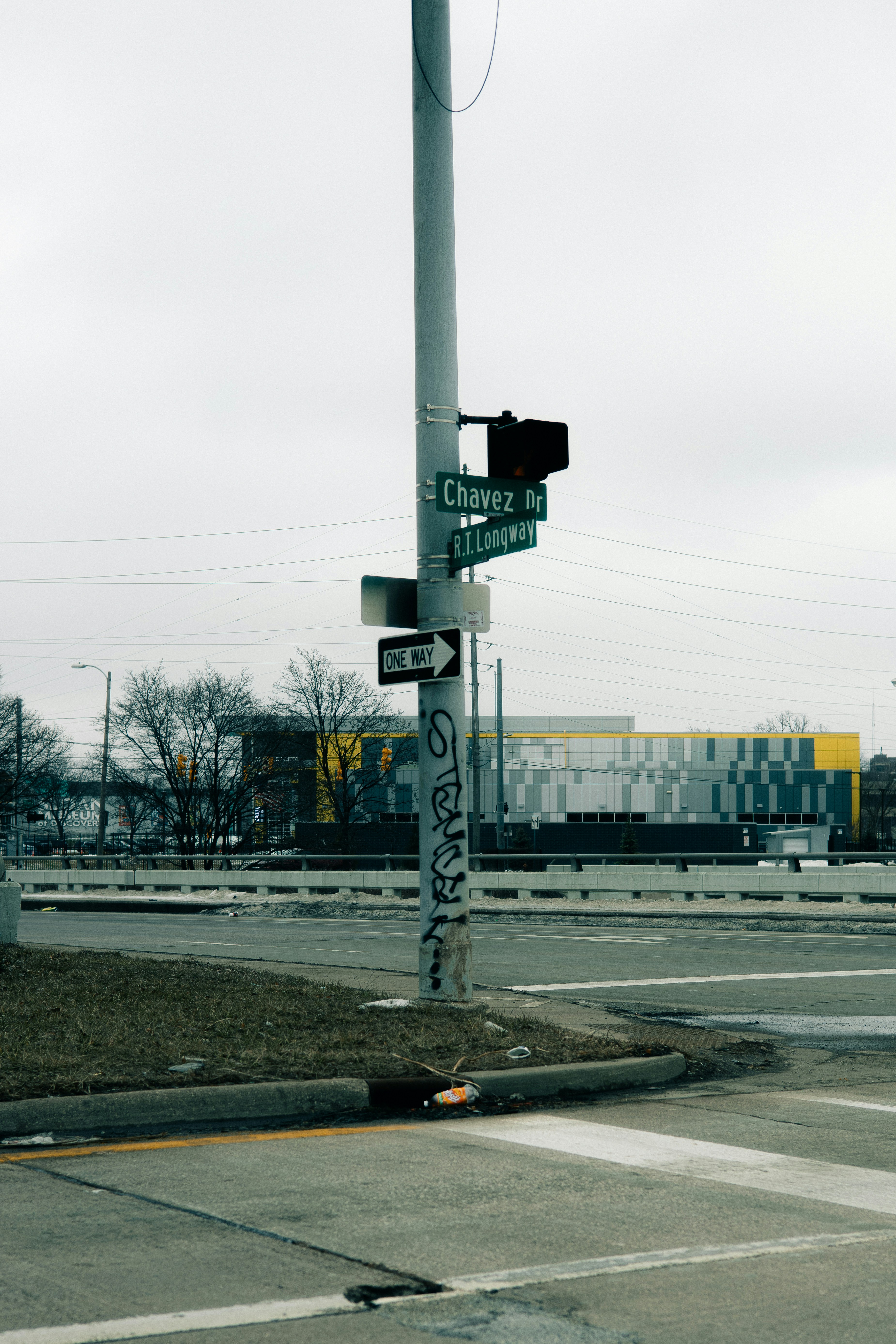 a traffic light sitting on the side of a road