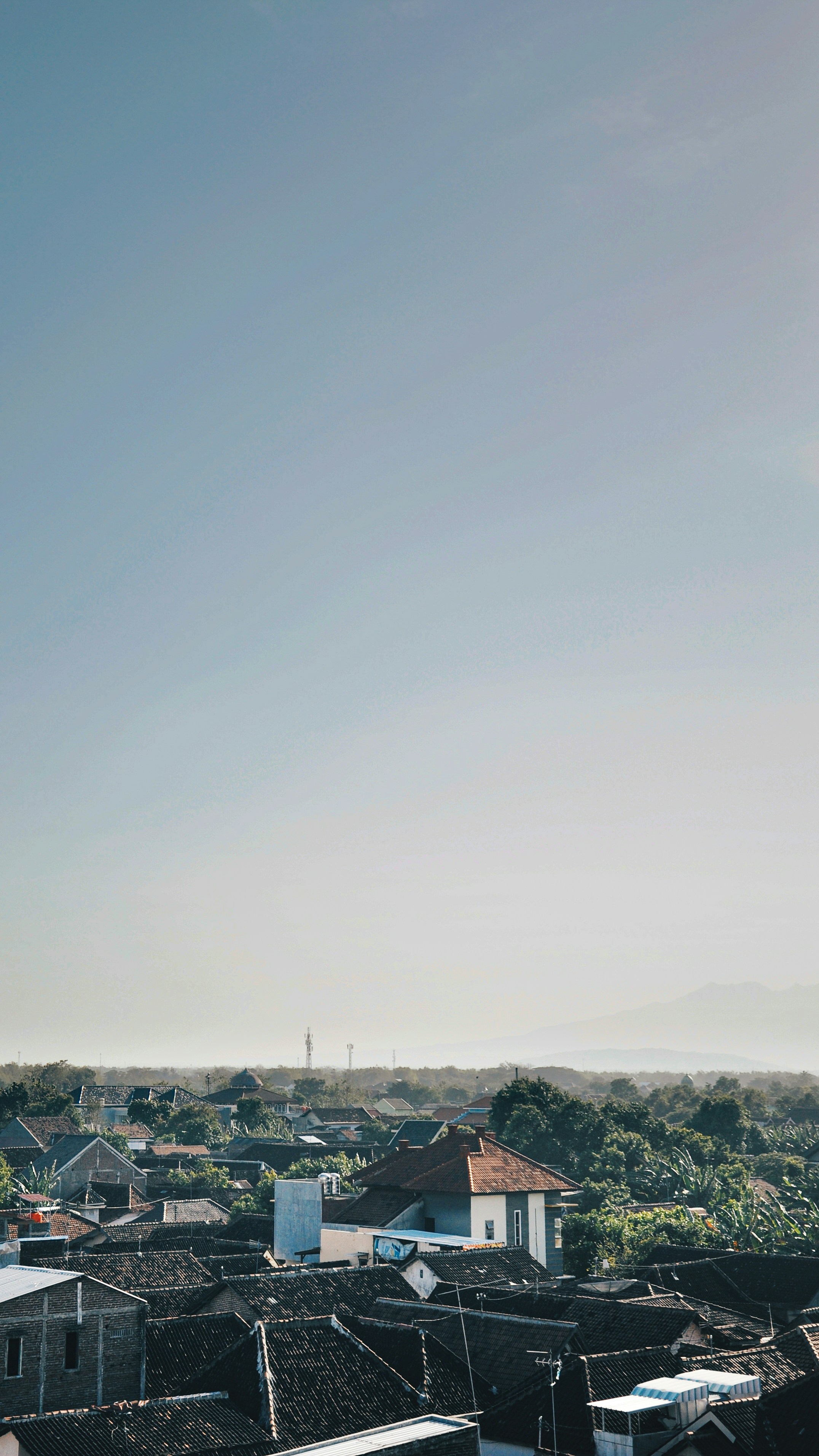 A view of a town from a roof top photo – Free Urban Image on Unsplash